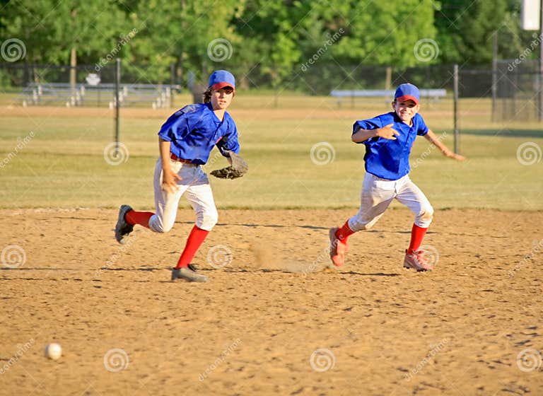 Boys Running for the Ball stock image. Image of child - 4167393