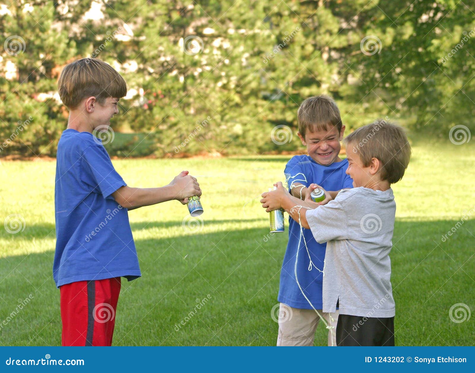 Boys Shooting String stock photo. Image of color, boys - 1243202