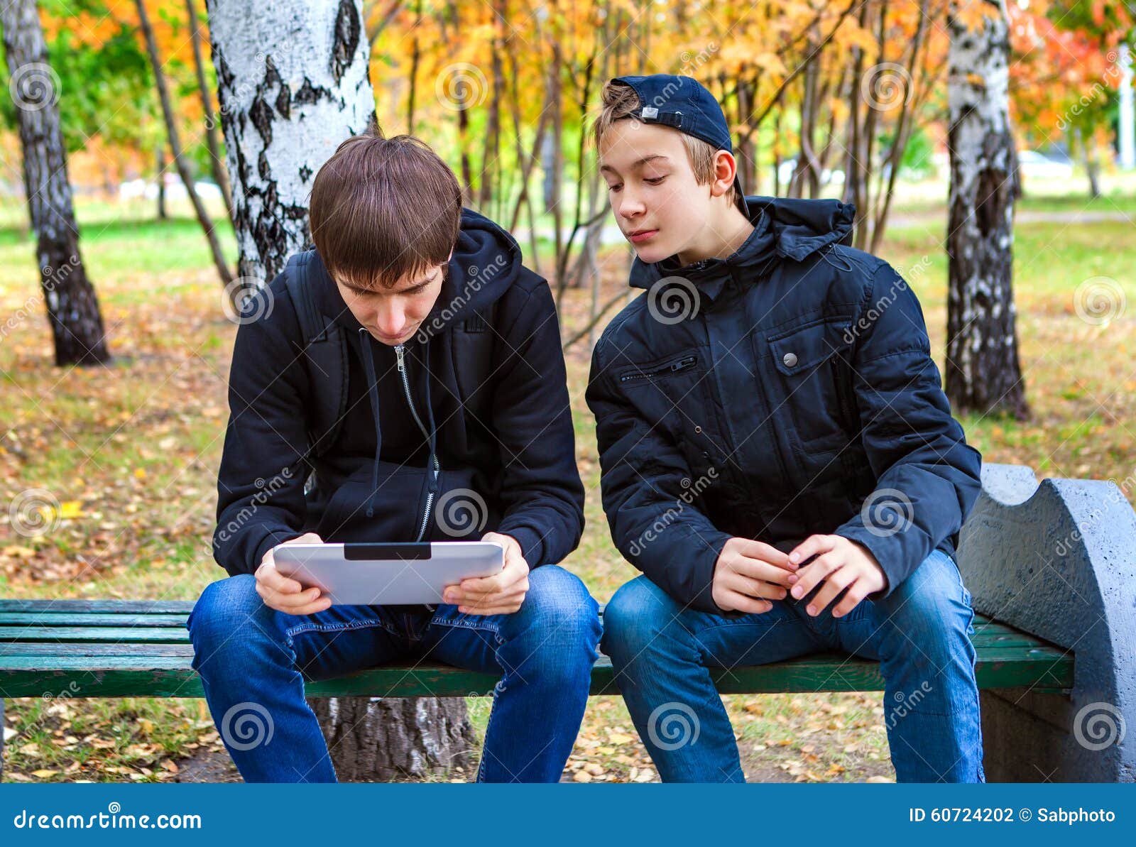 Boys with Tablet outdoor stock photo. Image of boys, keek - 60724202