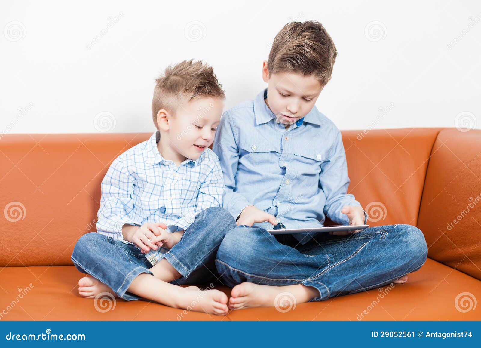 Boys with tablet pc stock image. Image of home, device - 29052561