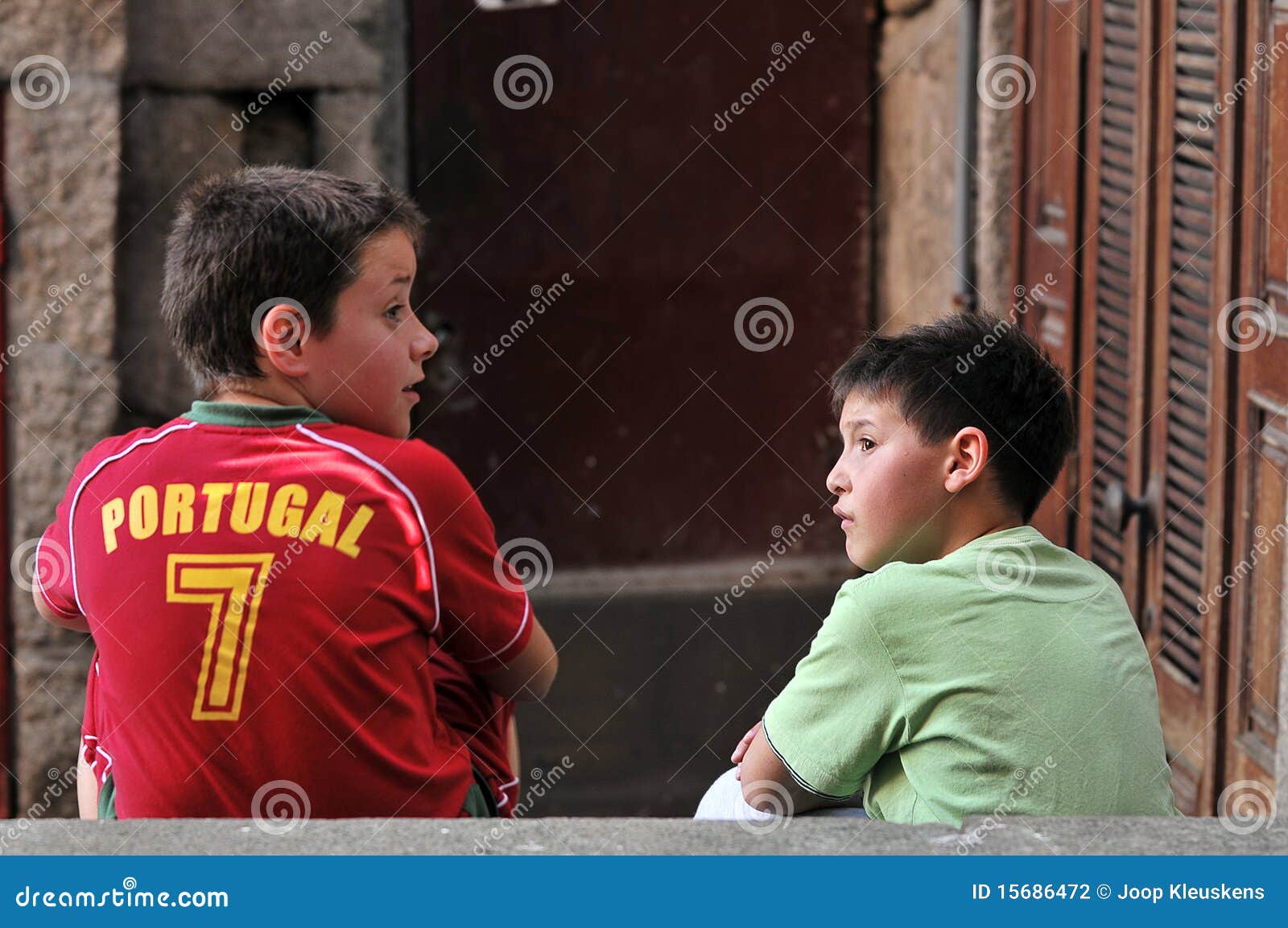 Boys talking about soccer editorial photography. Image of shirt - 15686472
