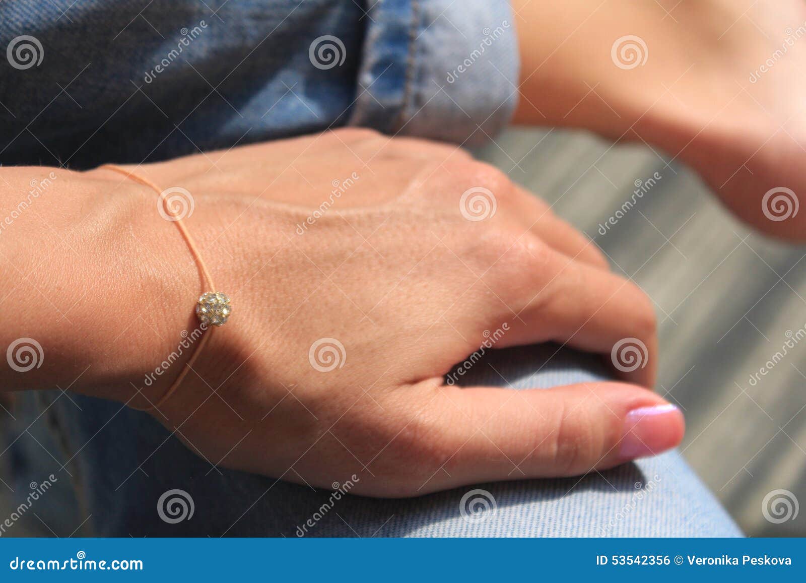 Bracelet on hand stock photo. Image of indicating, forearm - 53542356