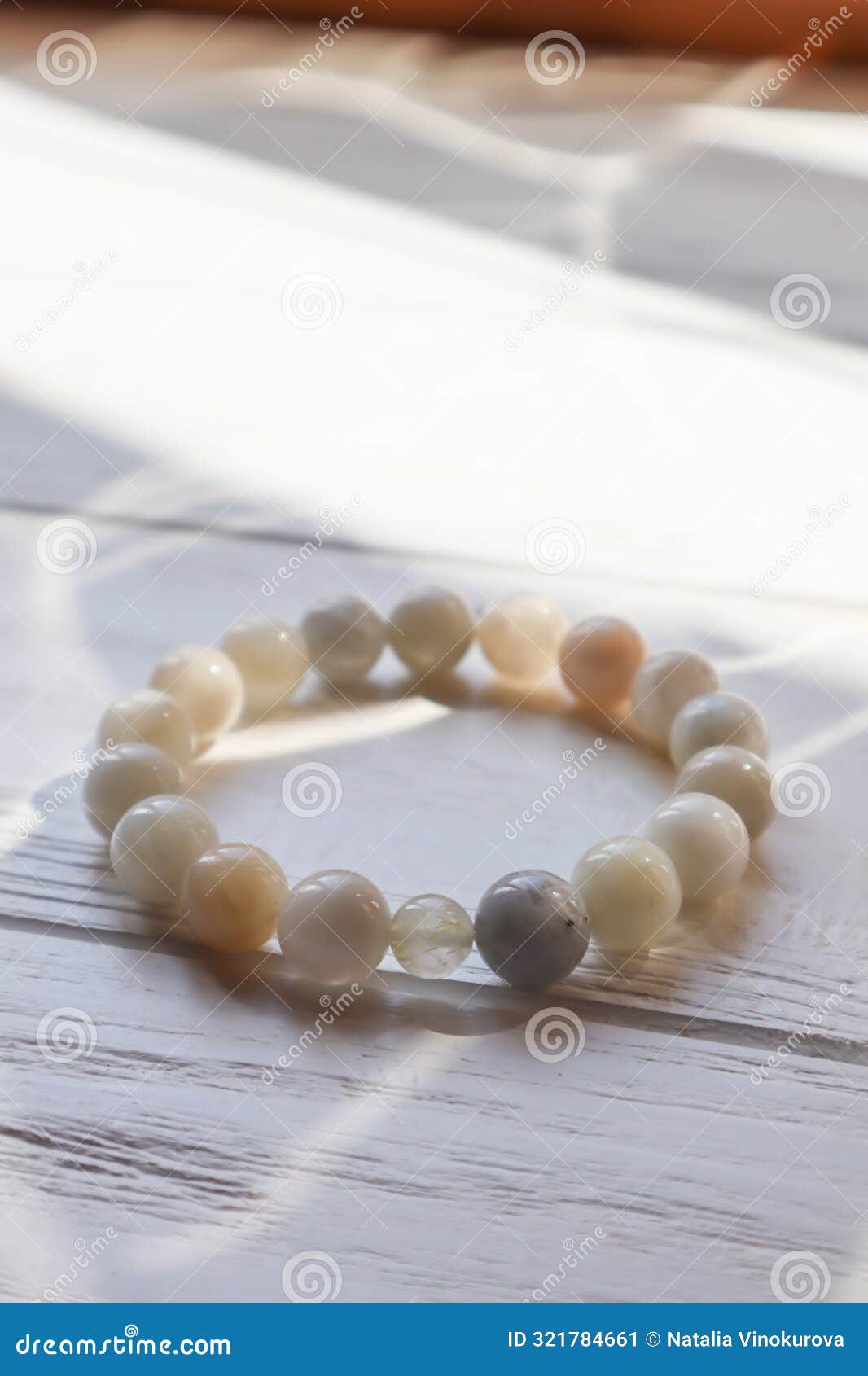 Bracelet from Moon Stone on a White Table. Stock Image - Image of ...