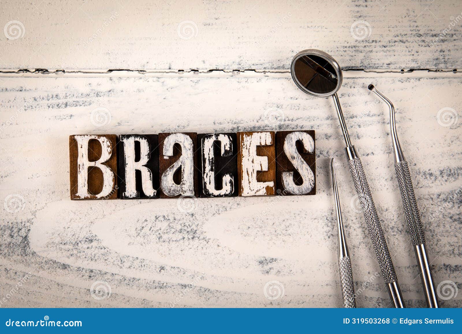 BRACES. Alphabet Blocks and Doctor Tools on White Wooden Texture ...