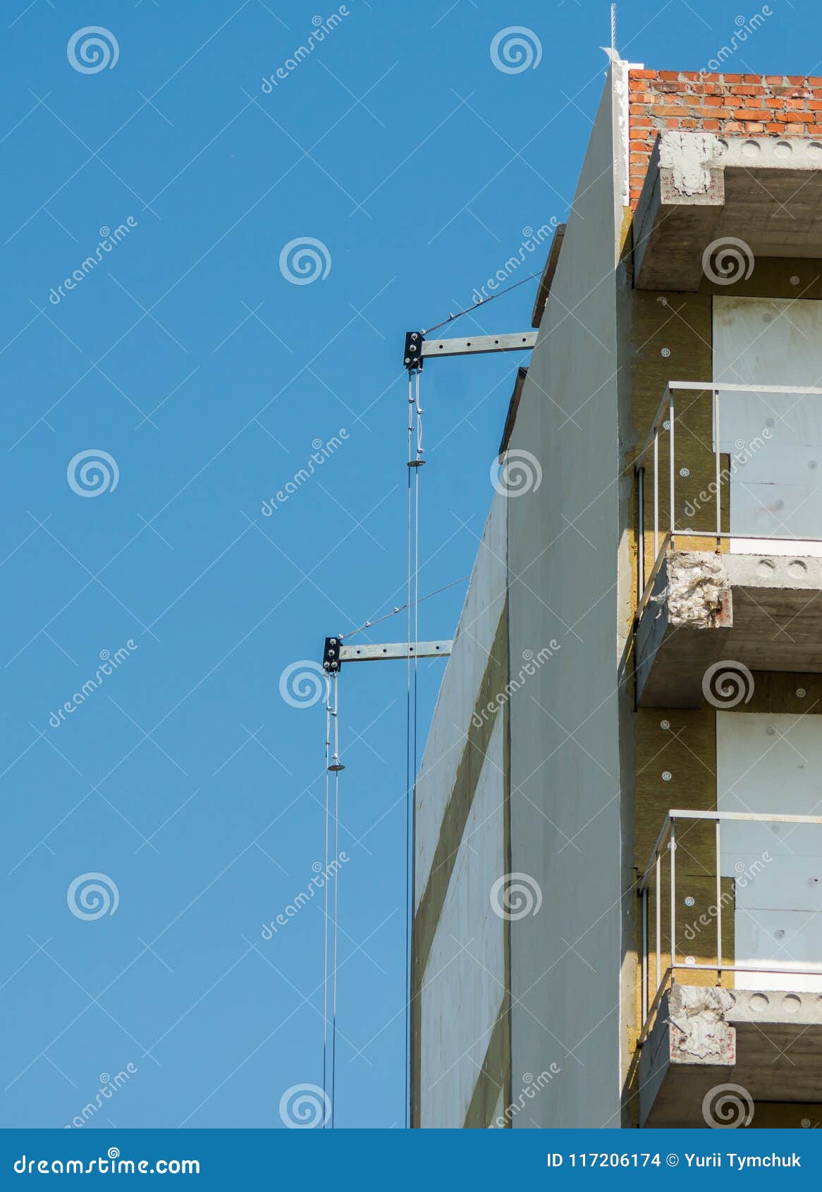 Brackets for Construction Cradle on the Roof on the Blue Background ...