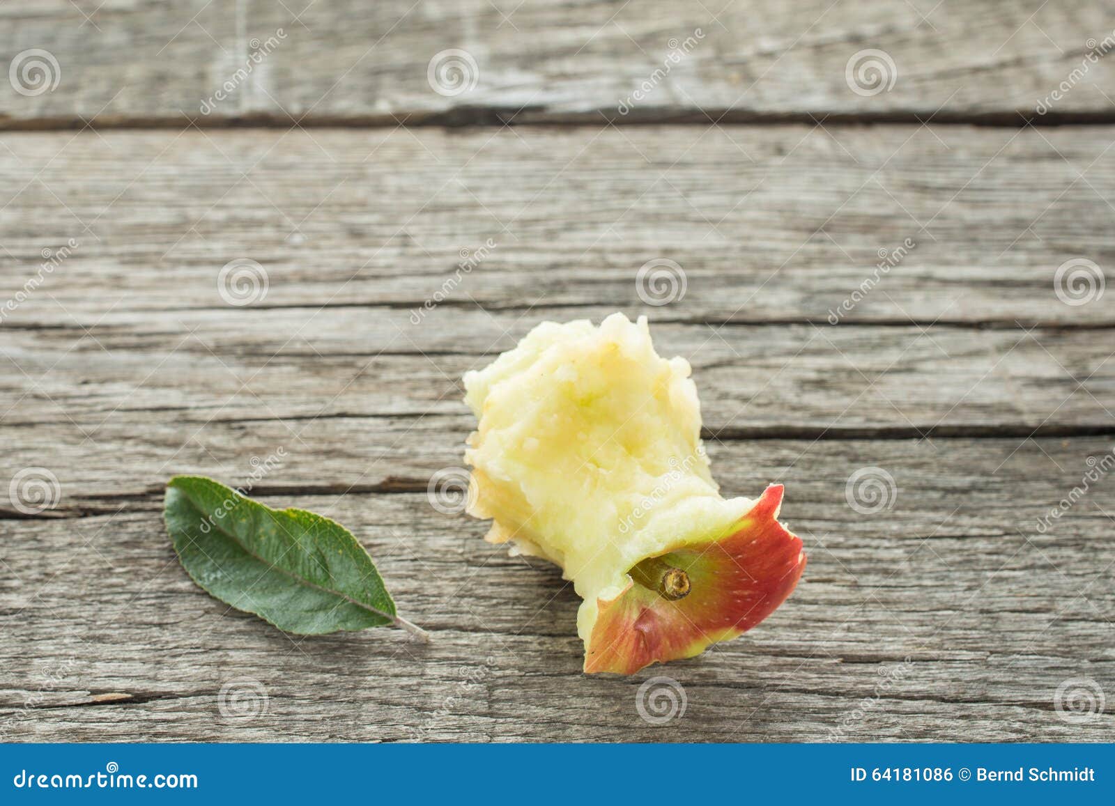 Braeburn Apple Core with Green Leaf Stock Photo - Image of bite, fruit ...