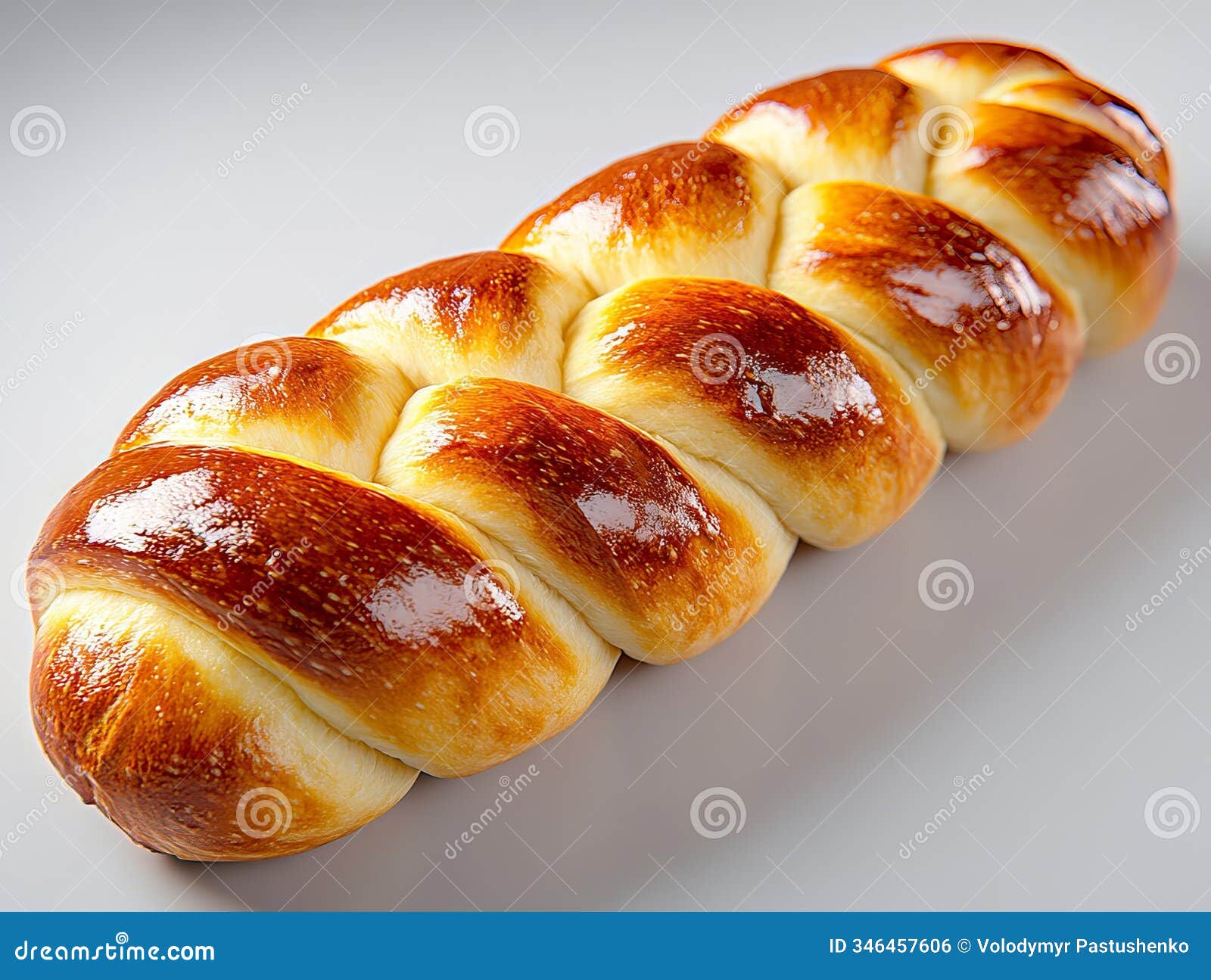 A Braided Loaf of Bread on a White Surface Stock Photo - Image of edges ...