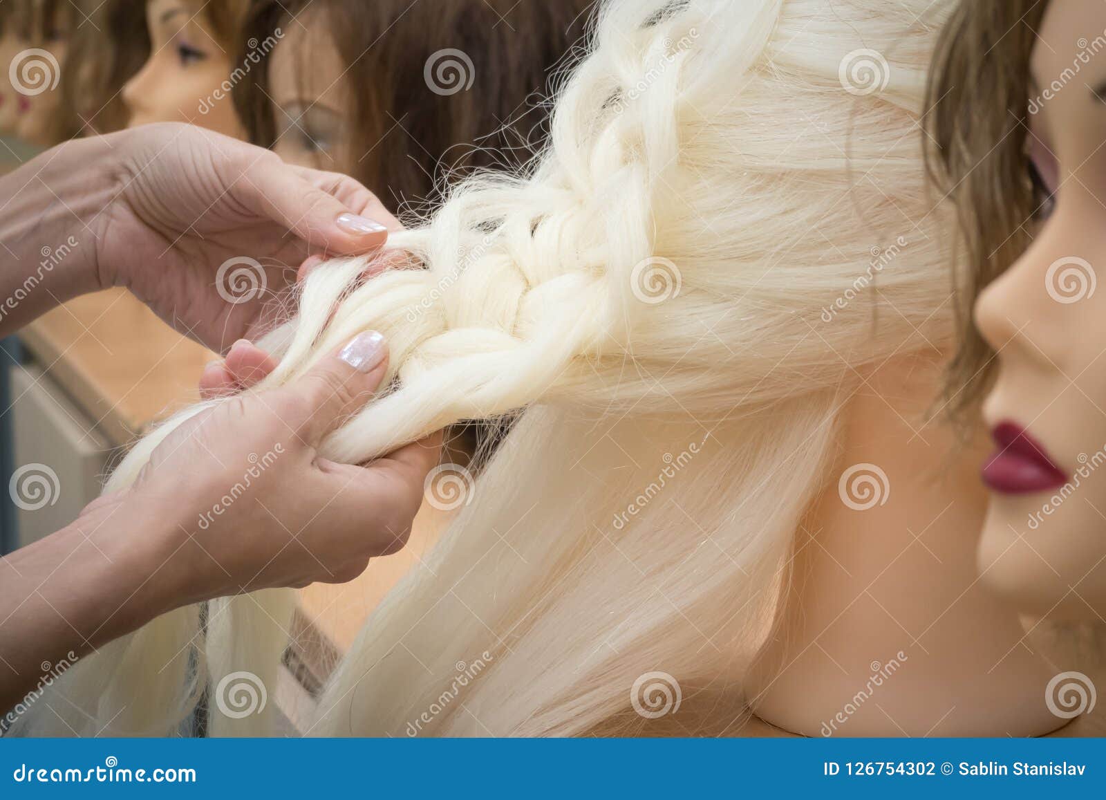 Braiding a Braid on a Mannequin. Beauty Concept. Stock Photo - Image of ...