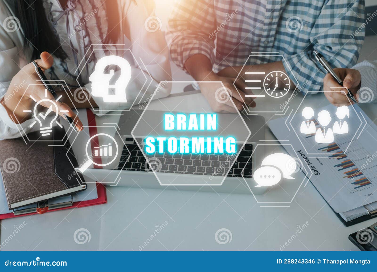 Business Team Working on Laptop Computer with Brain Storming Icon on ...