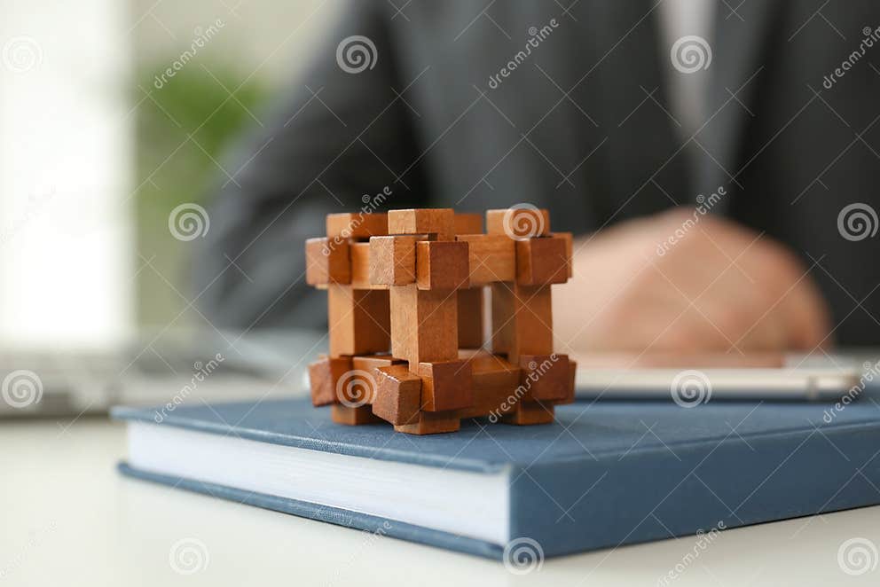 Brain Teaser on Table of Businessman Stock Photo - Image of complexity ...