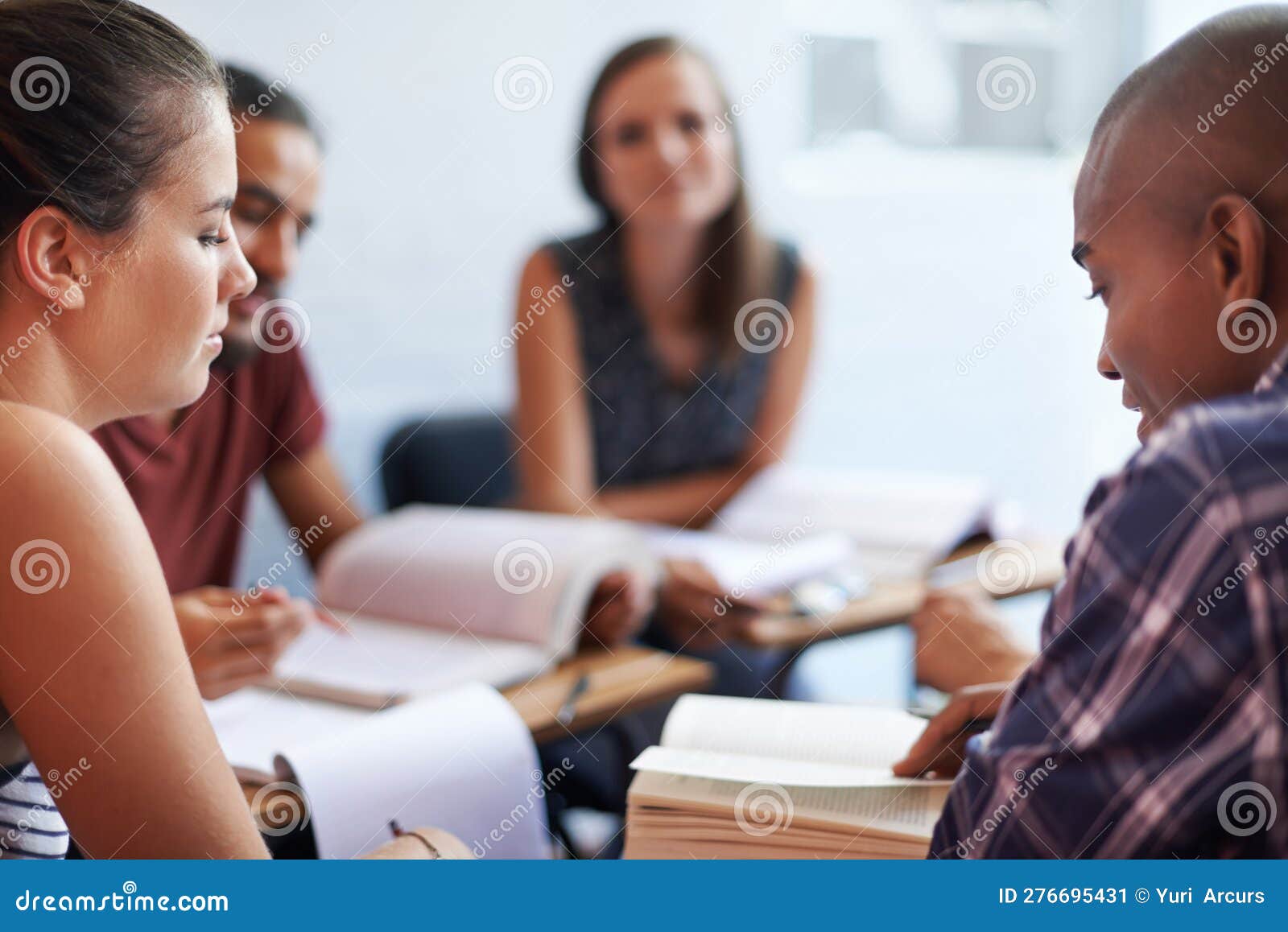 Brainstorming an Assignment. a Group of University Students Studying ...