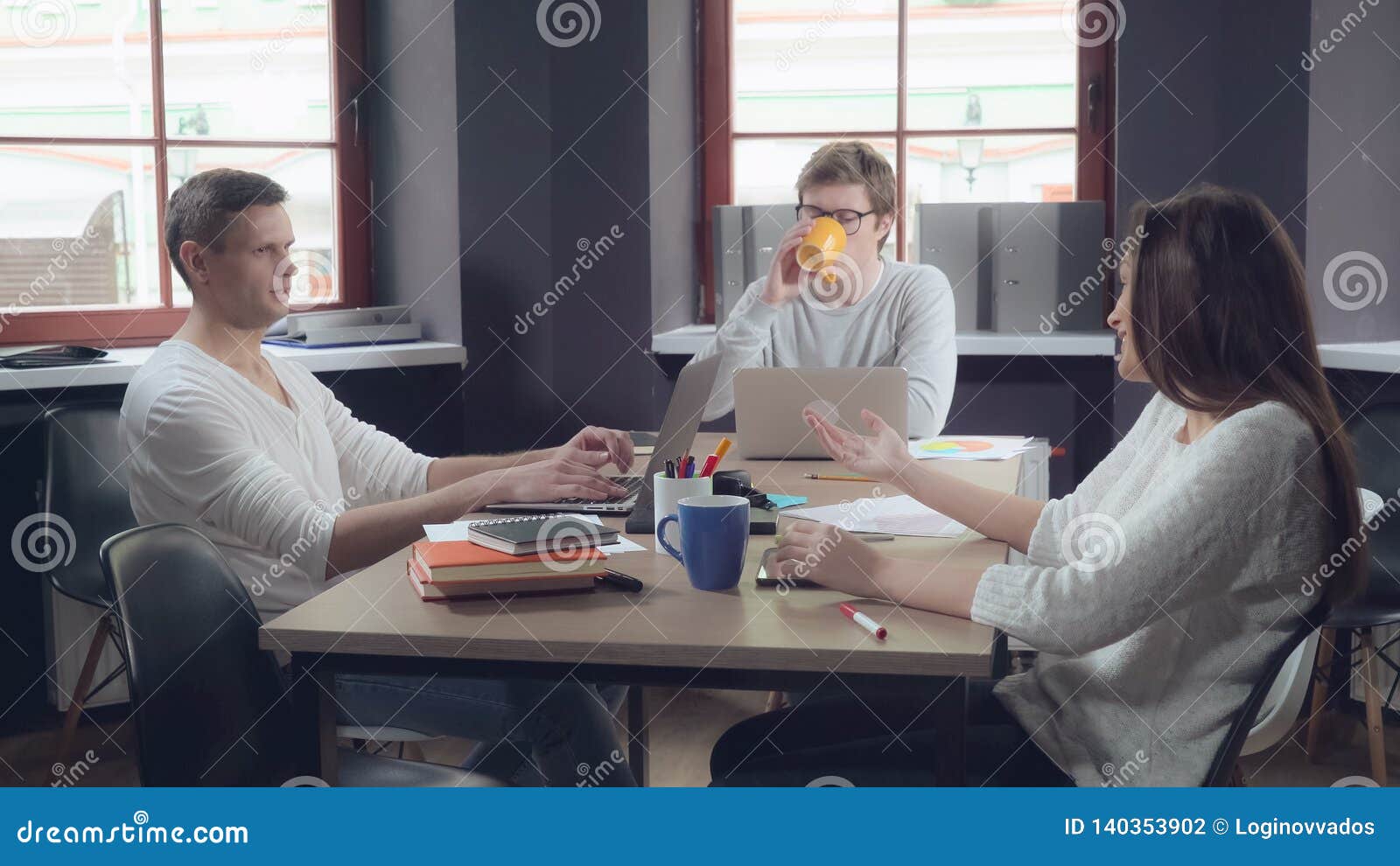 Business Team Sitting at the Working Place. Stock Photo - Image of ...