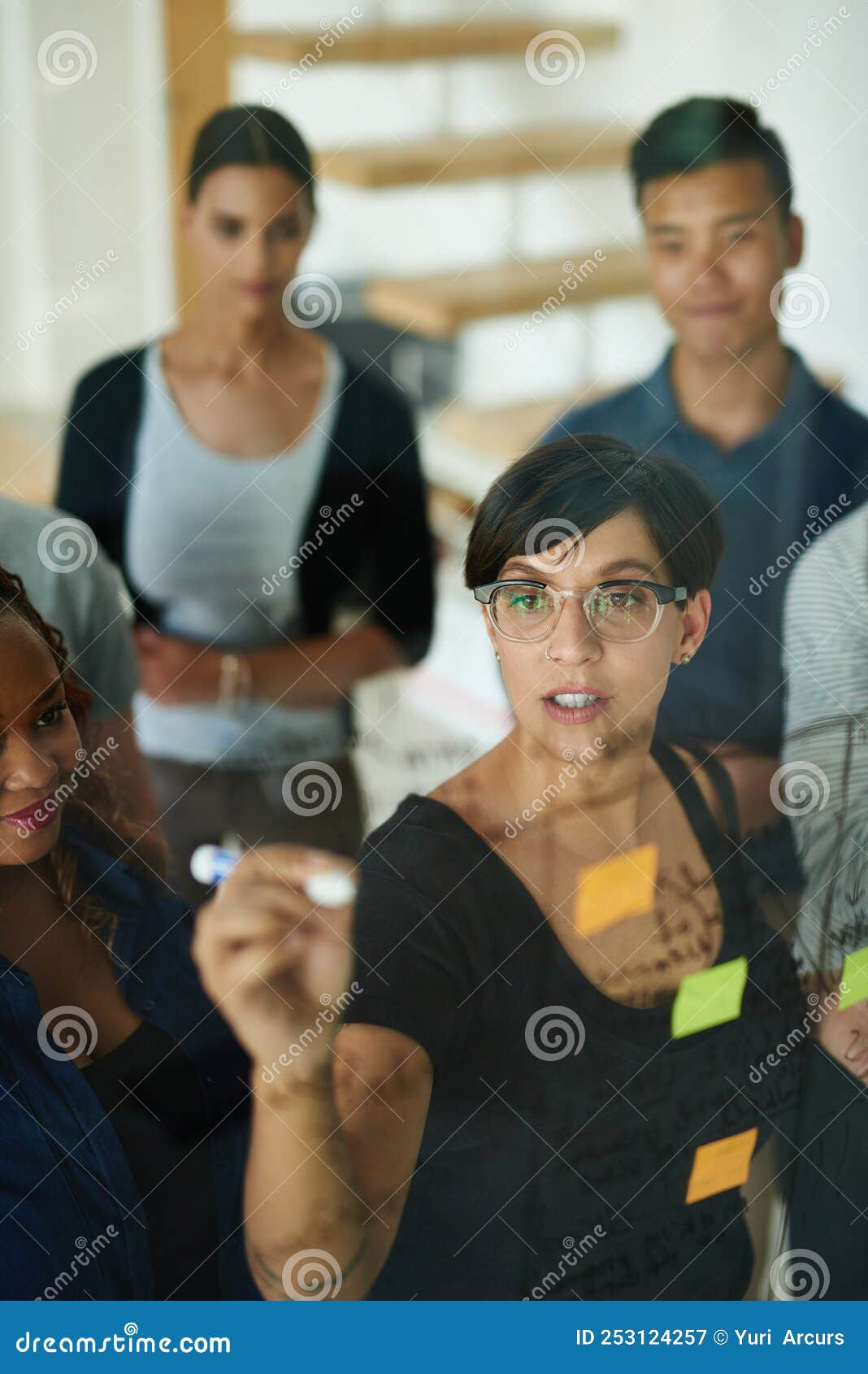 Brainstorming, Diverse and Creative Team Writing a Strategy Idea on ...