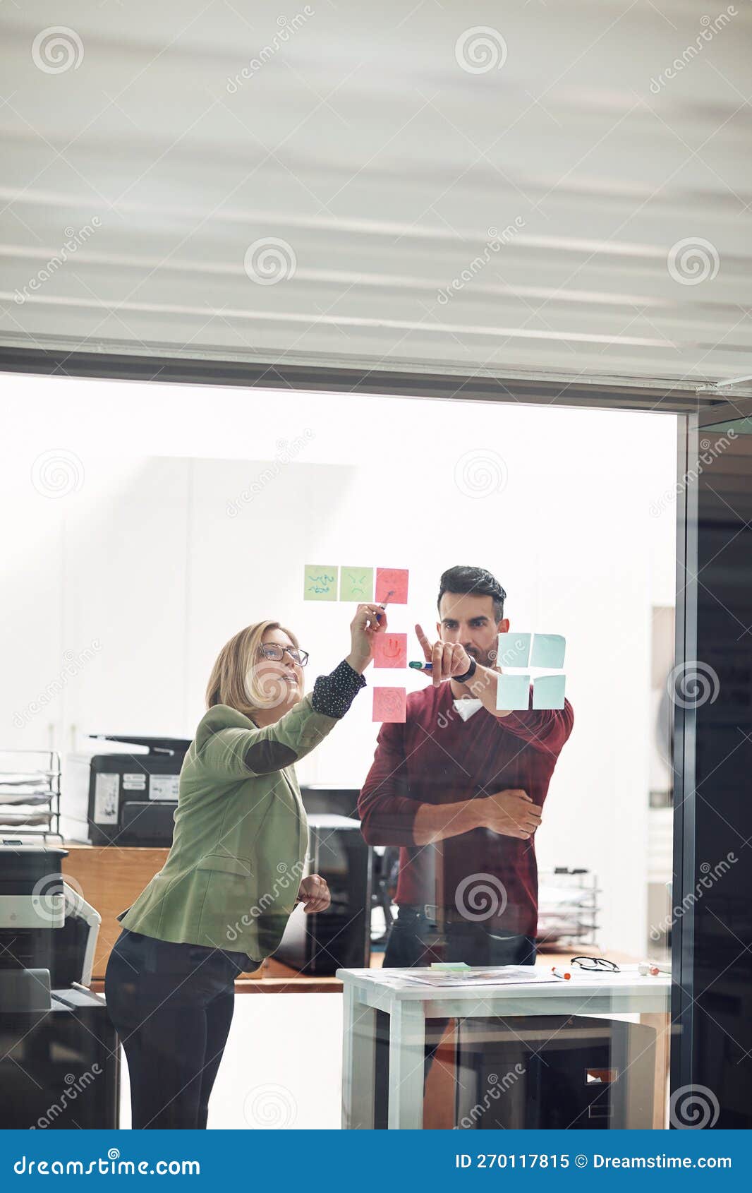 Brainstorming Puts the Fun in Work. Young Businesspeople in the Office ...