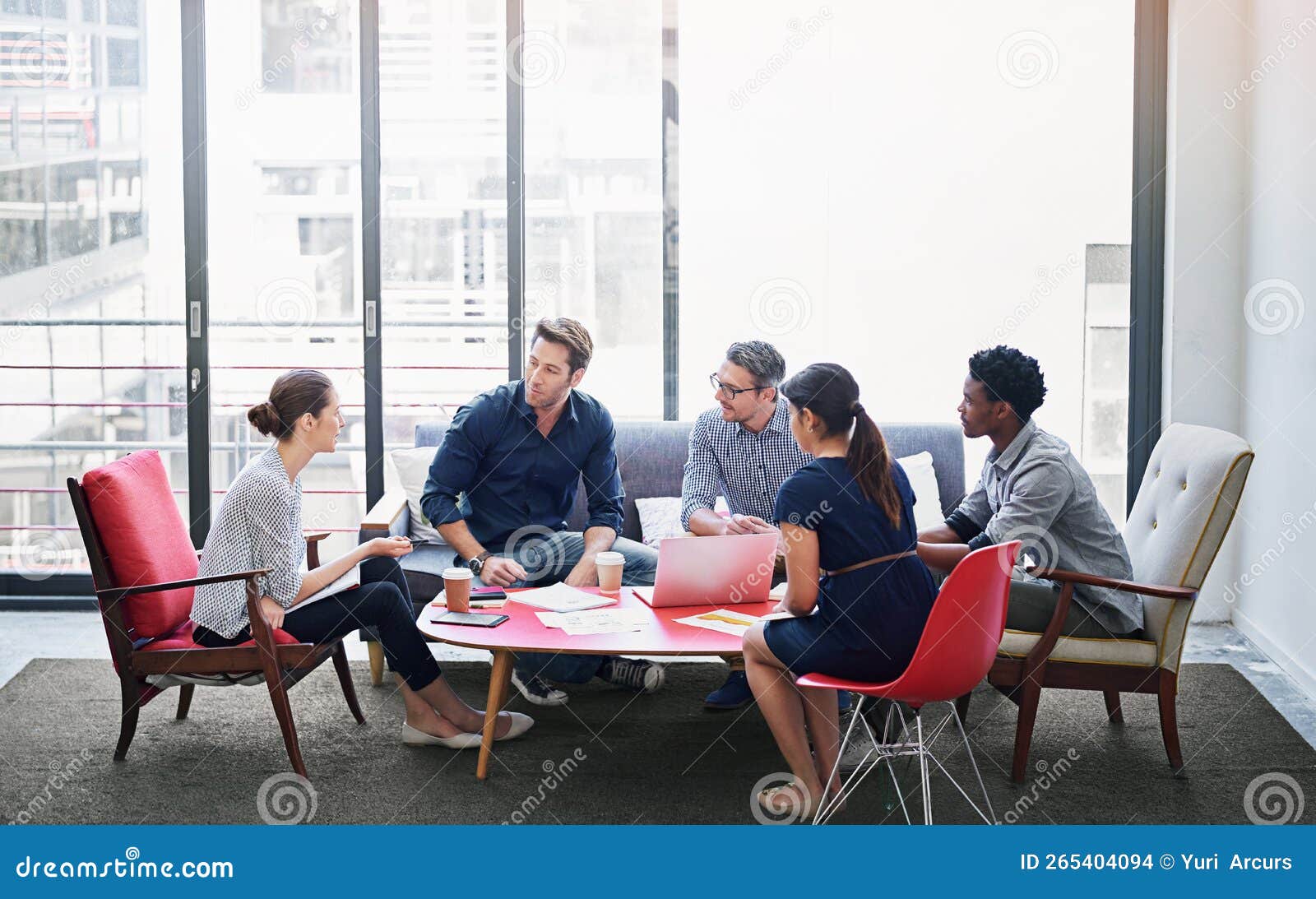 Brainstorming Session in Progress. a Group of Coworkers in a Meeting in ...