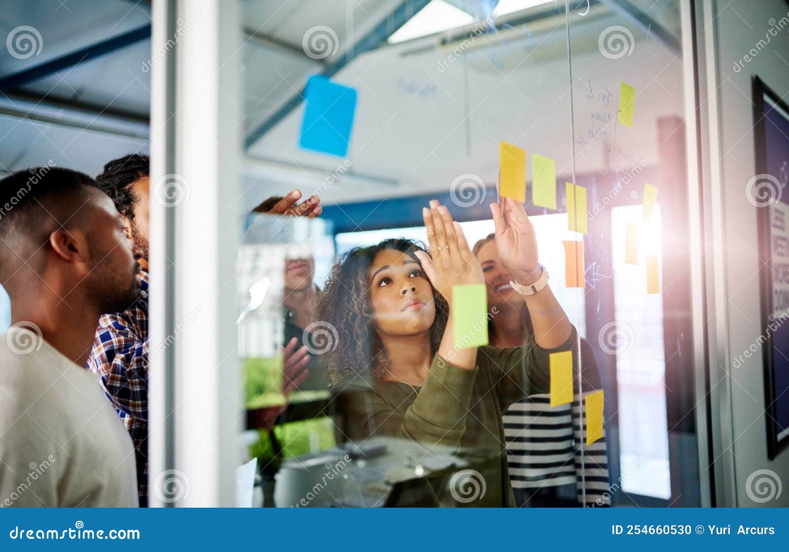 Brainstorming To Inspire Brilliance. Colleagues Having a Brainstorming ...