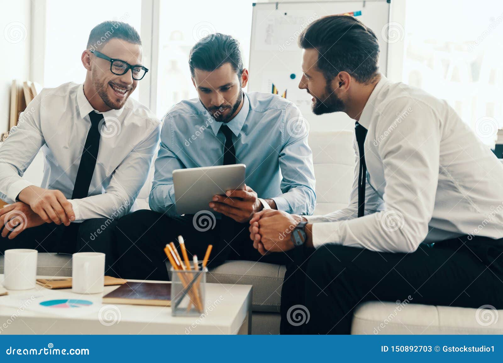 Brainstorming together. stock image. Image of brainstorming - 150892703
