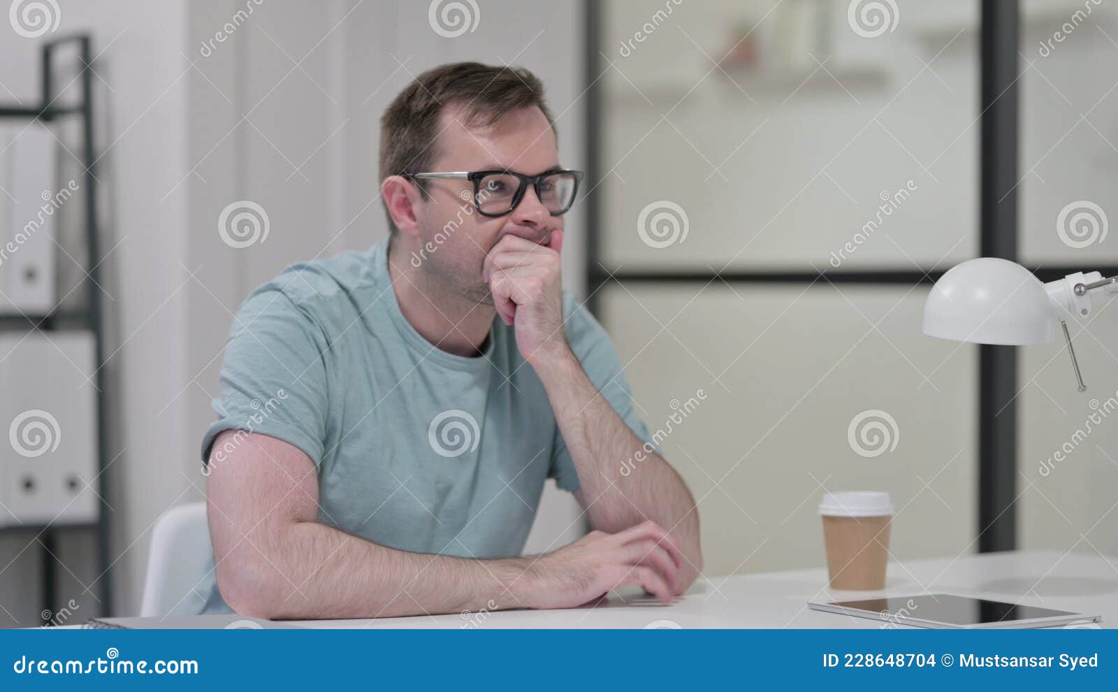 Brainstorming Young Man Thinking at Work Stock Photo - Image of ...