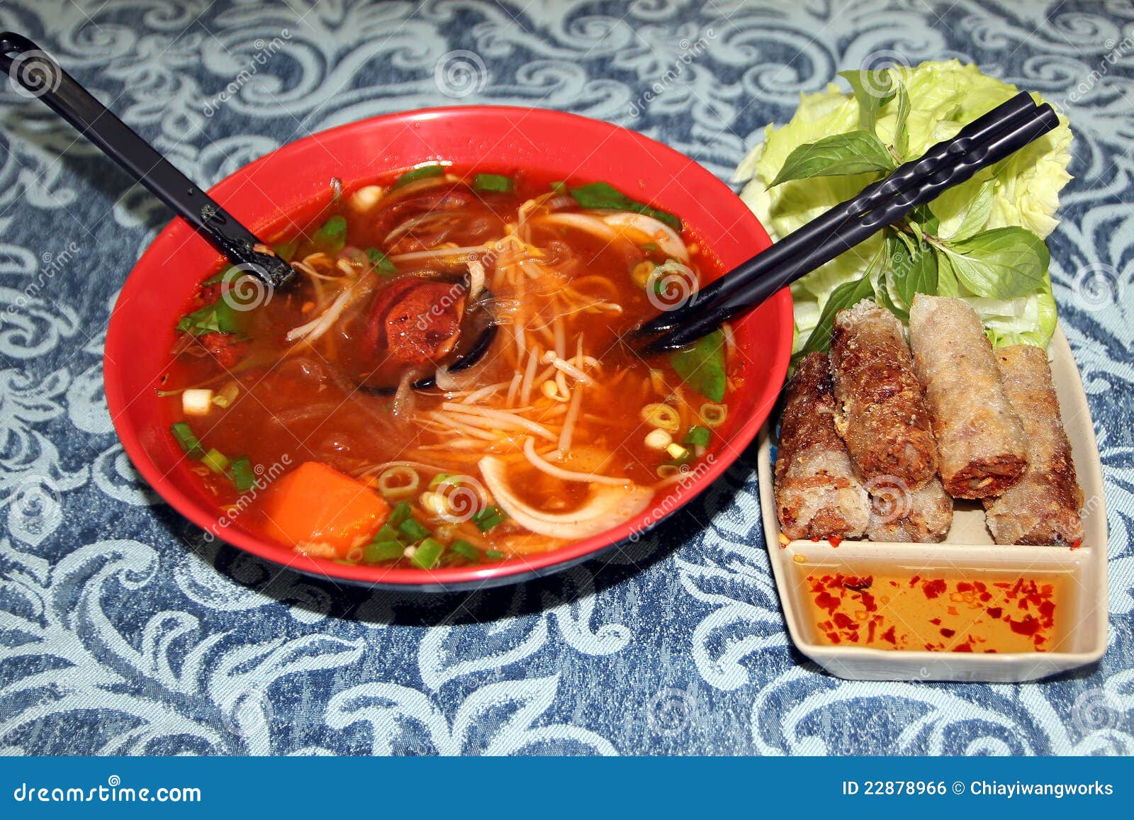 Braised Beef Rice Noodles with Fried Spring Rolls Stock Photo - Image ...