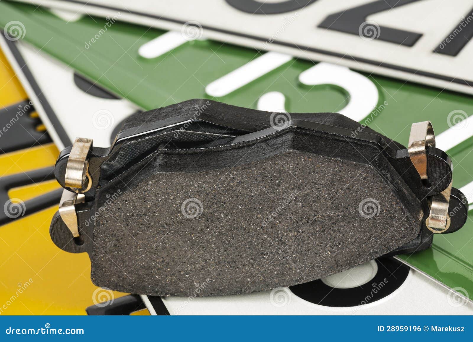 Brake Pads and License Plates Stock Photo - Image of painted, steel ...