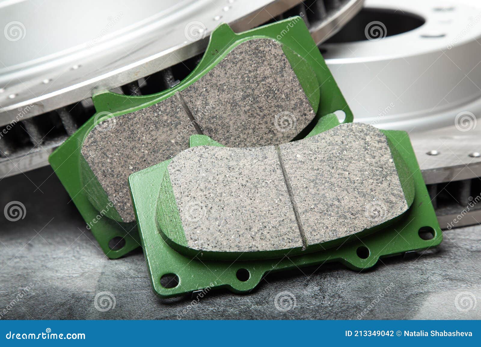 Brake Pads and Perforated Brake Discs on a Stone Gray Table Stock Photo ...