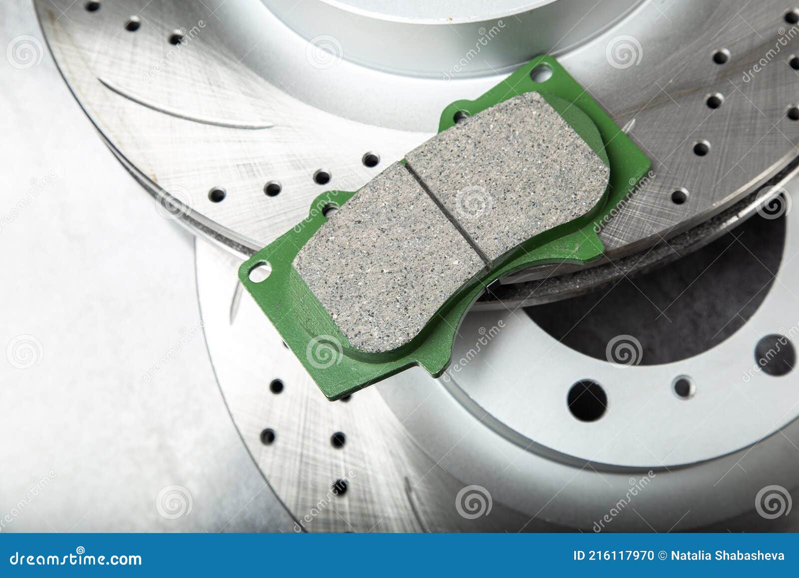Brake Pads and Perforated Brake Discs on a Stone Gray Table Stock Photo ...