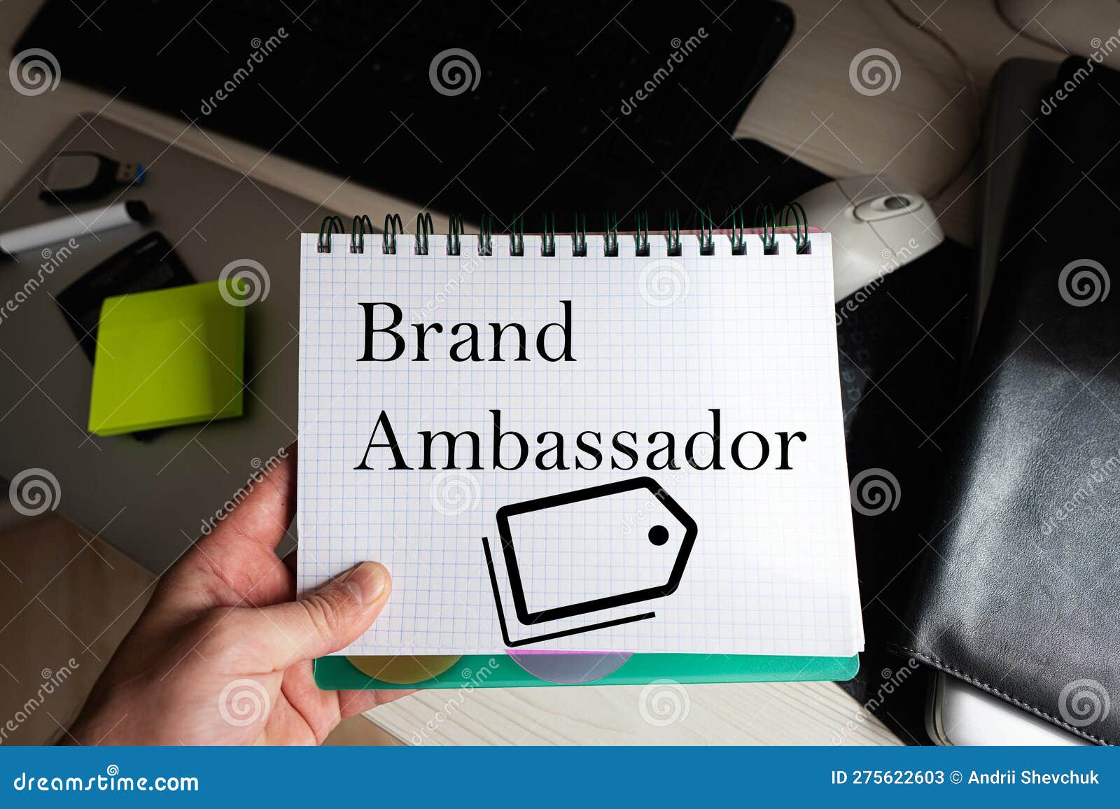 Brand Ambassador Word on Notebook Holding Man Against Desktop Stock ...