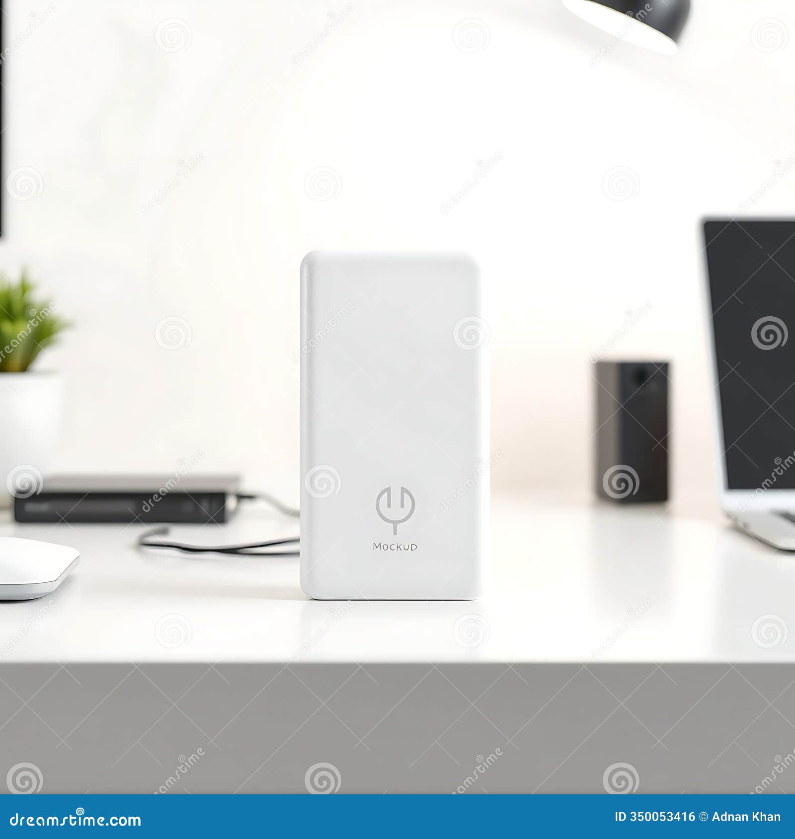 A Branded Power Bank Mockup Displayed on a Clean Desk with a White ...