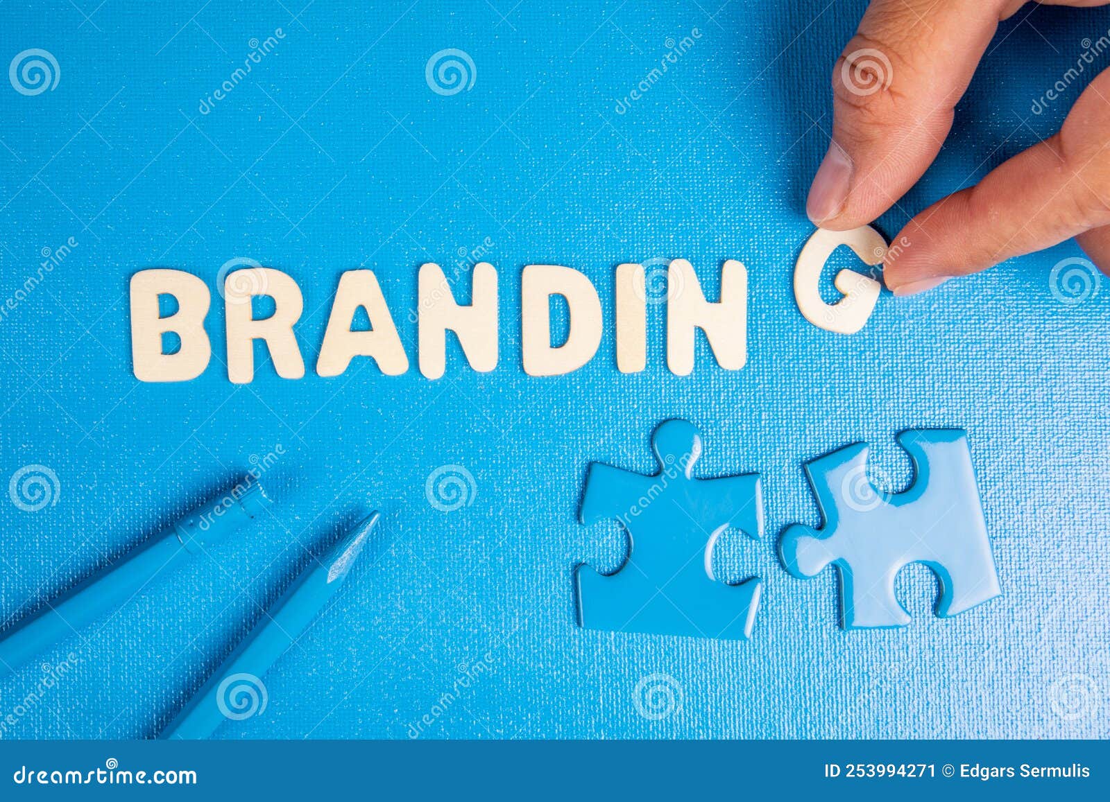 Branding. Text from White Wooden Letters on a Blue Background Stock ...