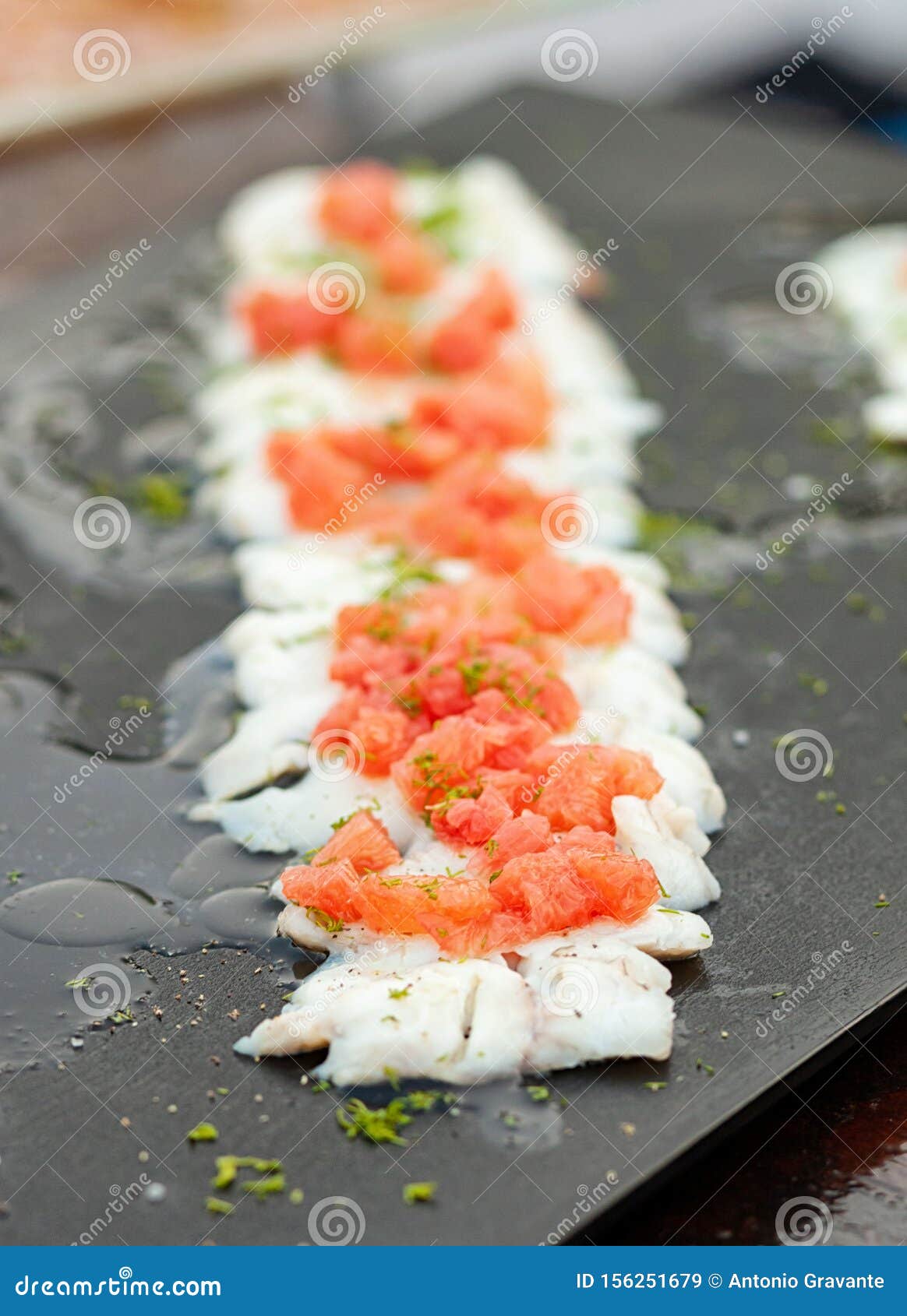 Branzino Fish Fillet with Tomatoes Stock Image - Image of cutting, fish ...