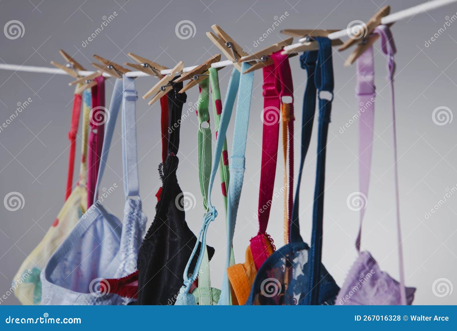 Bras Hanging on a Line in a Studio Environment Stock Photo - Image of ...