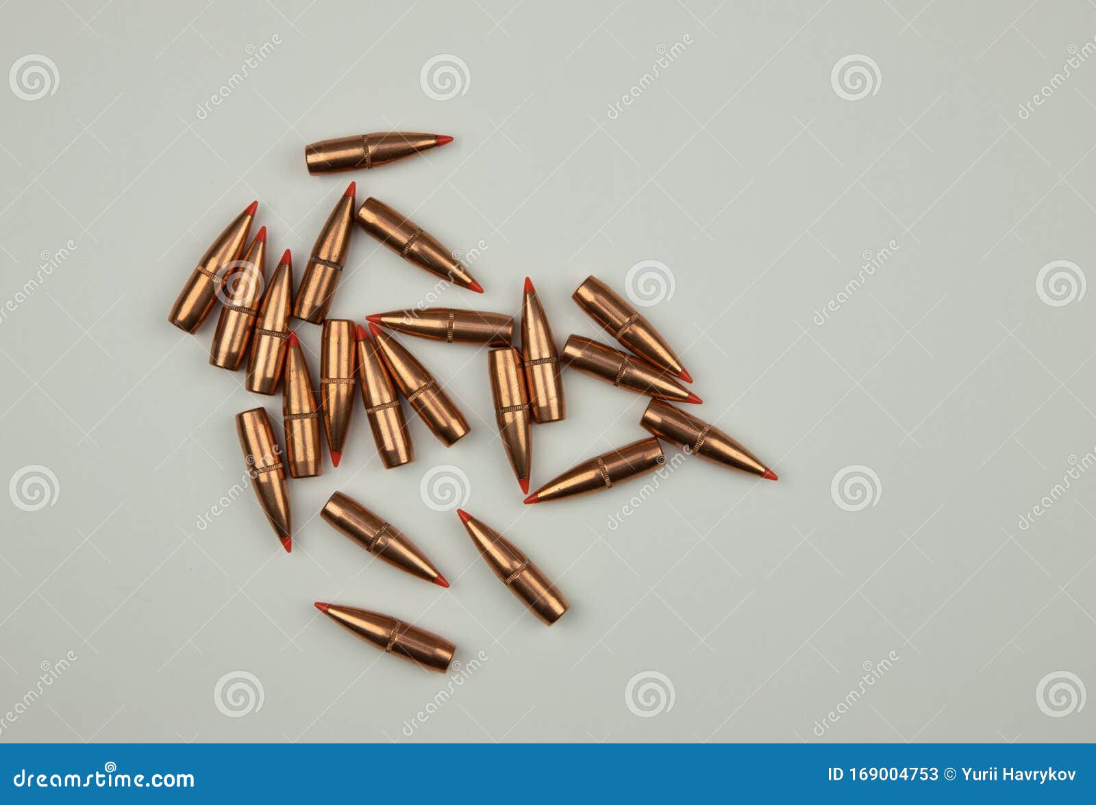 Brass Bullets Lie on a White Background, Plastic Tips Stock Image ...