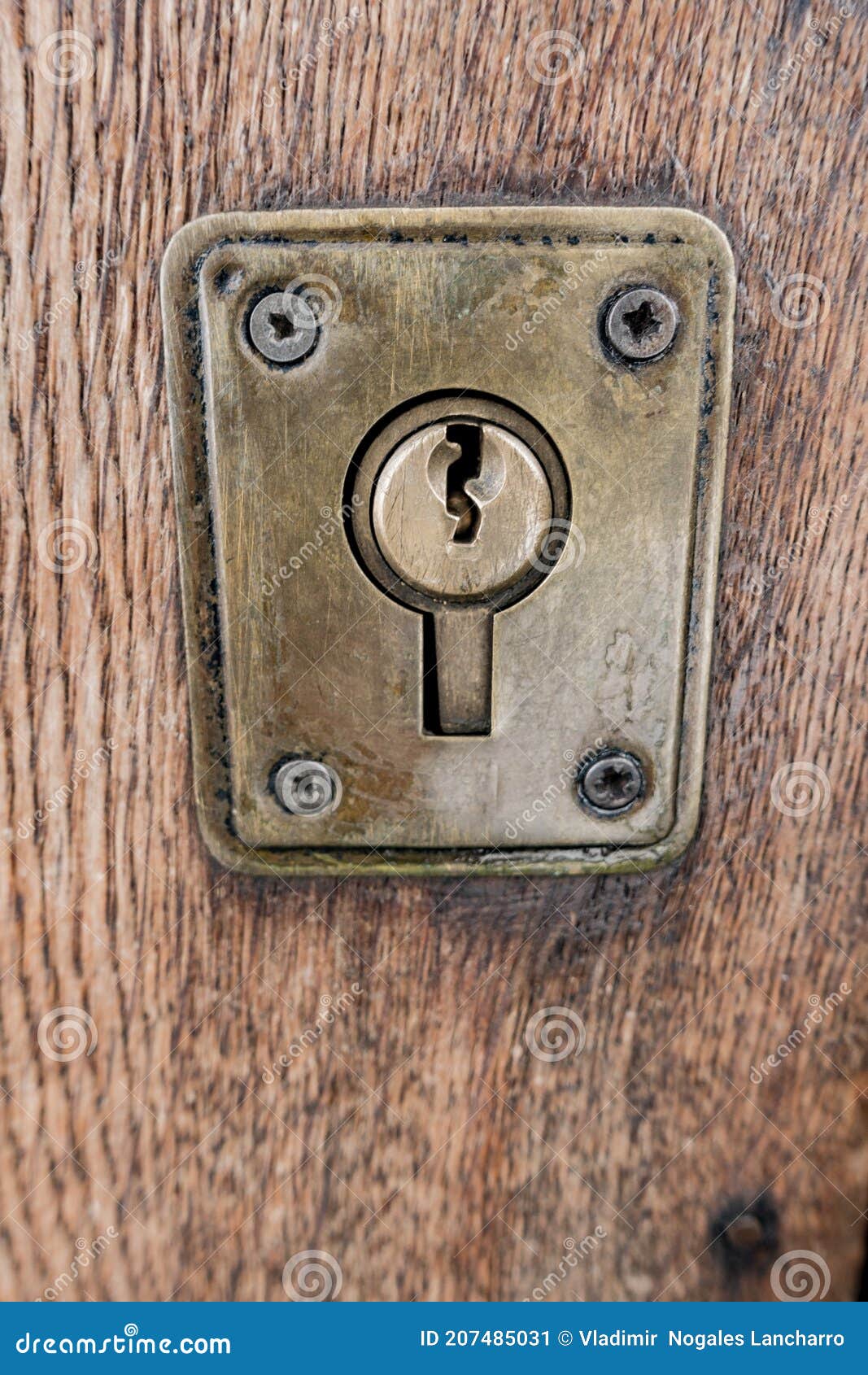 Brass lock on rustic wood stock image. Image of lock - 207485031