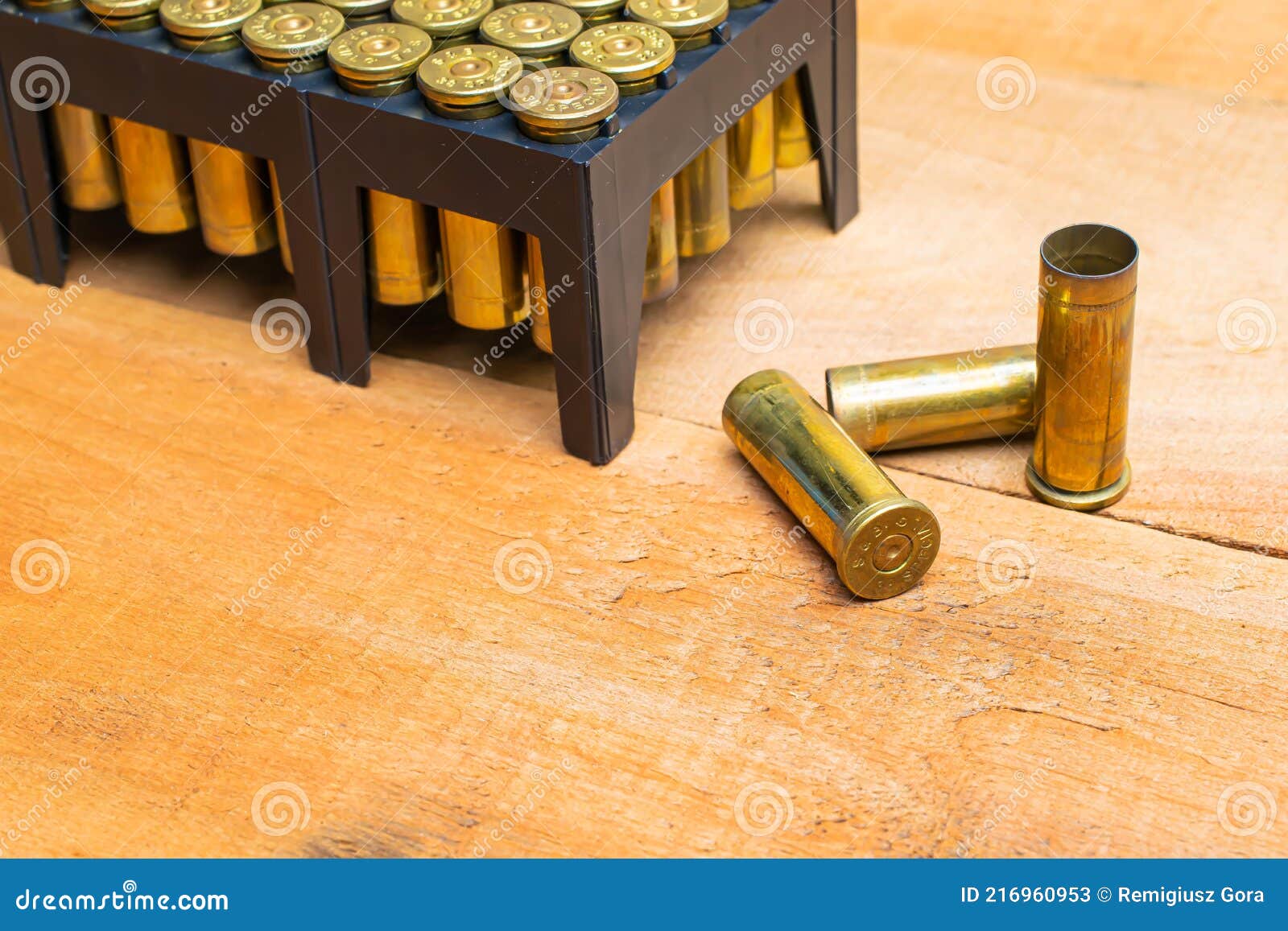 Brass Pistol Shells in a Container 50 Pcs Stock Image - Image of ...