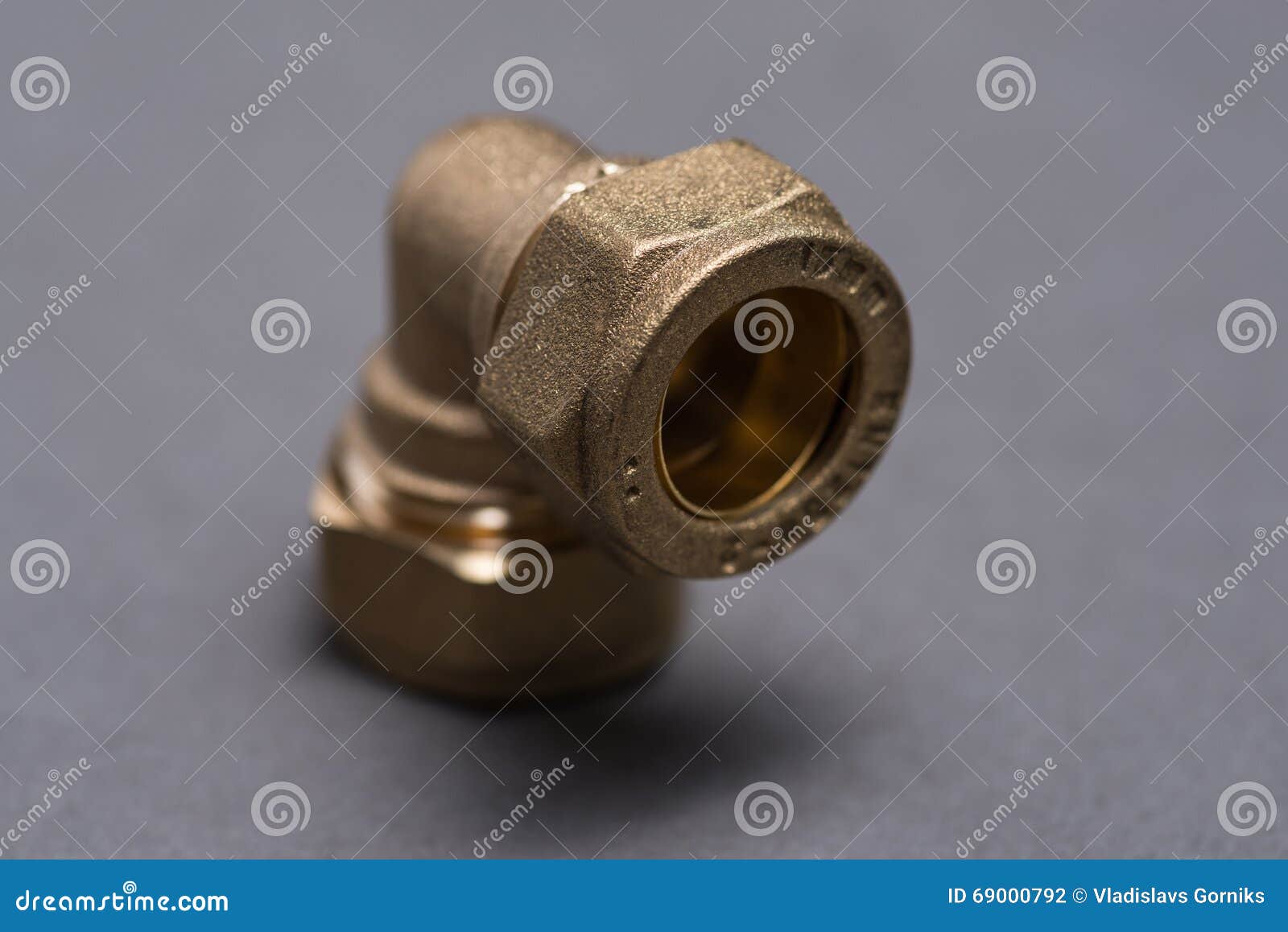 Brass Plumbing Compression Fittings on Grey Table Stock Photo - Image ...