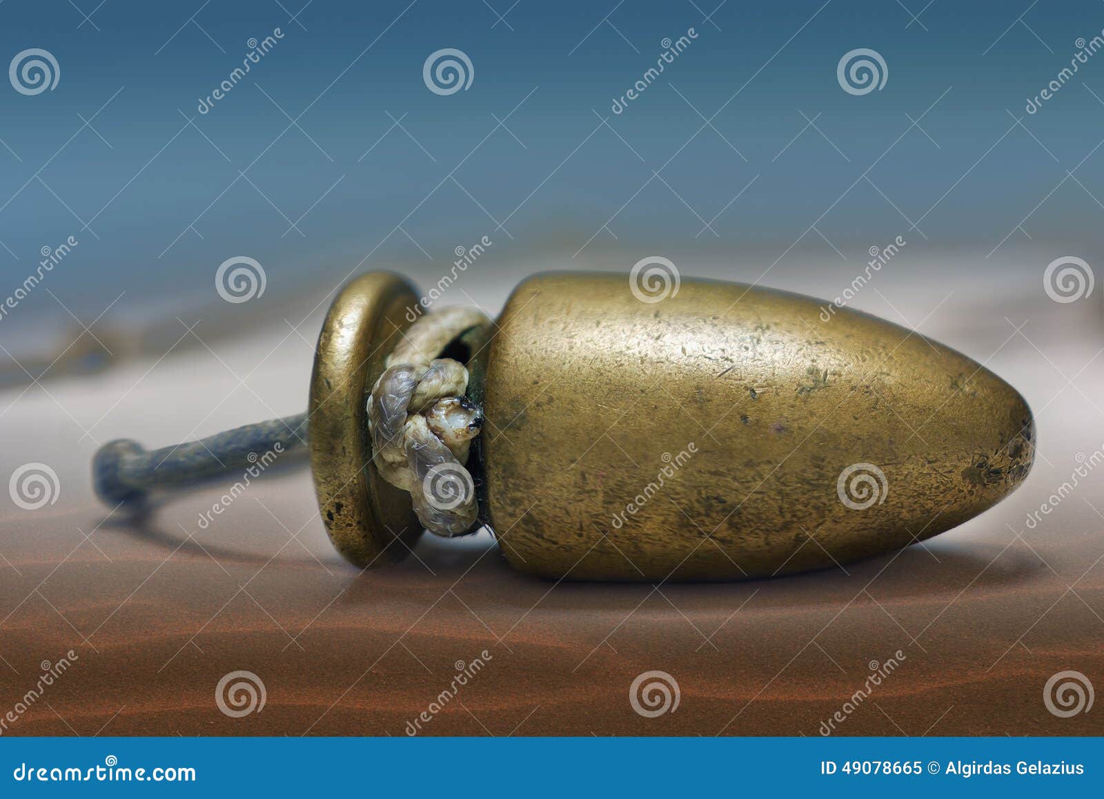 Brass plummet or plumb bob stock image. Image of rope - 49078665