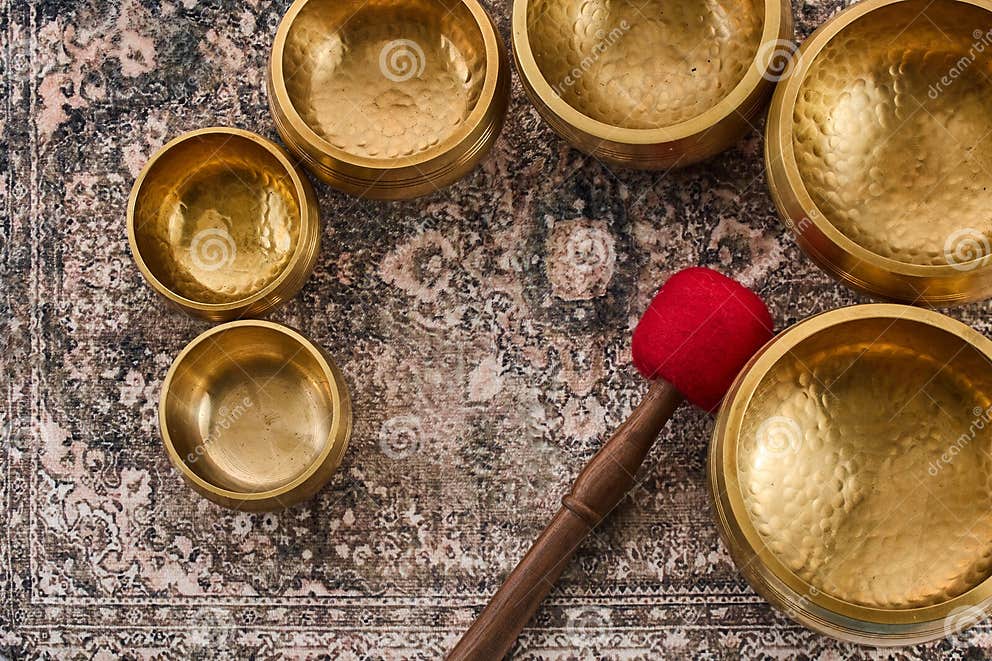 Brass Singing Bowls on Rug stock image. Image of antique - 355009099