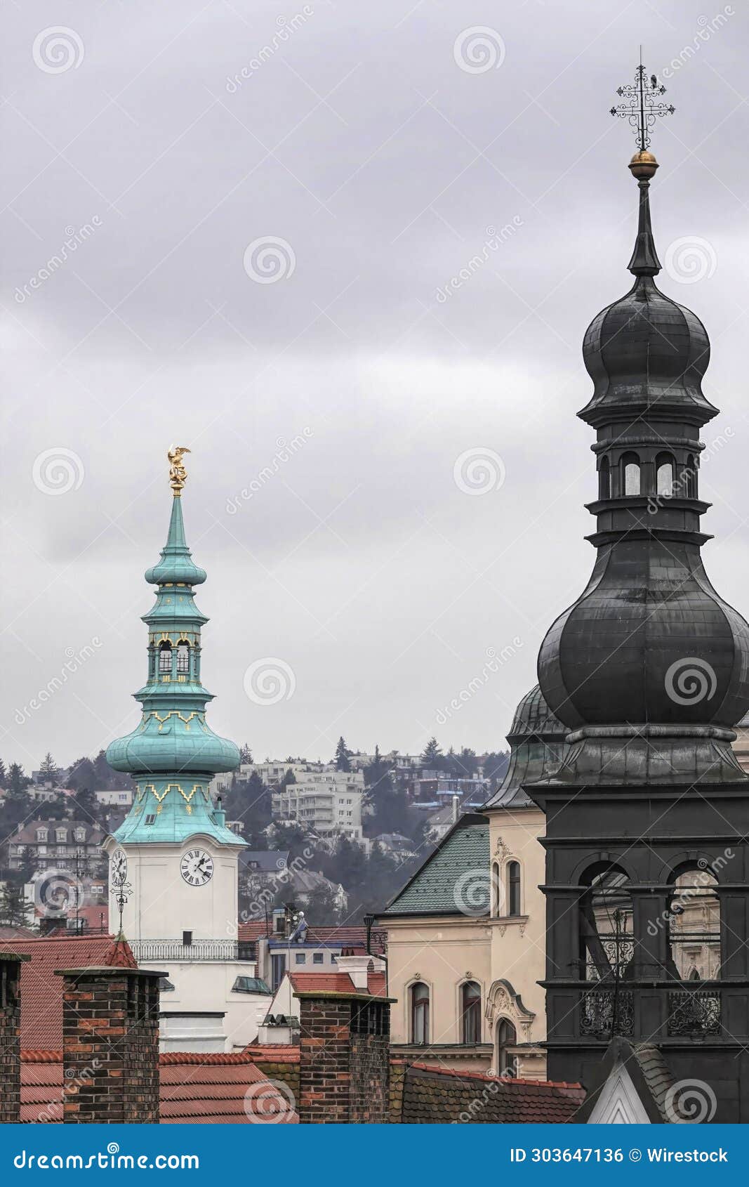 Breathtaking View of Two Clock Towers Against a Cloudy Sky in ...