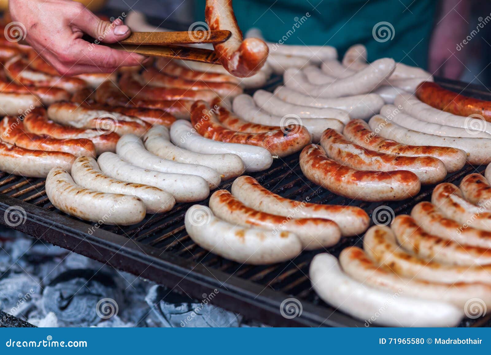 Bratwurst on a large grill stock photo. Image of brat - 71965580