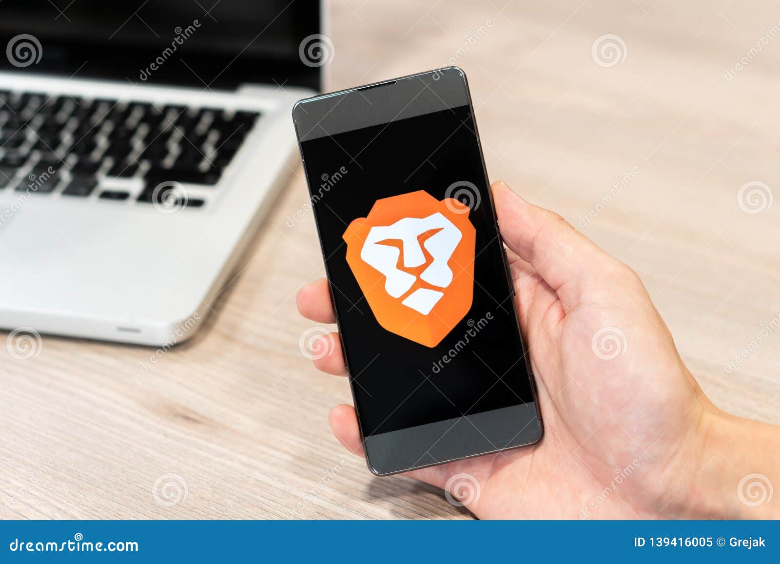Brave Browser Logo Displayed On Smartphone And Computer Laptop In ... Brave Browser Logo Displayed On Smartphone And Computer Laptop In ...