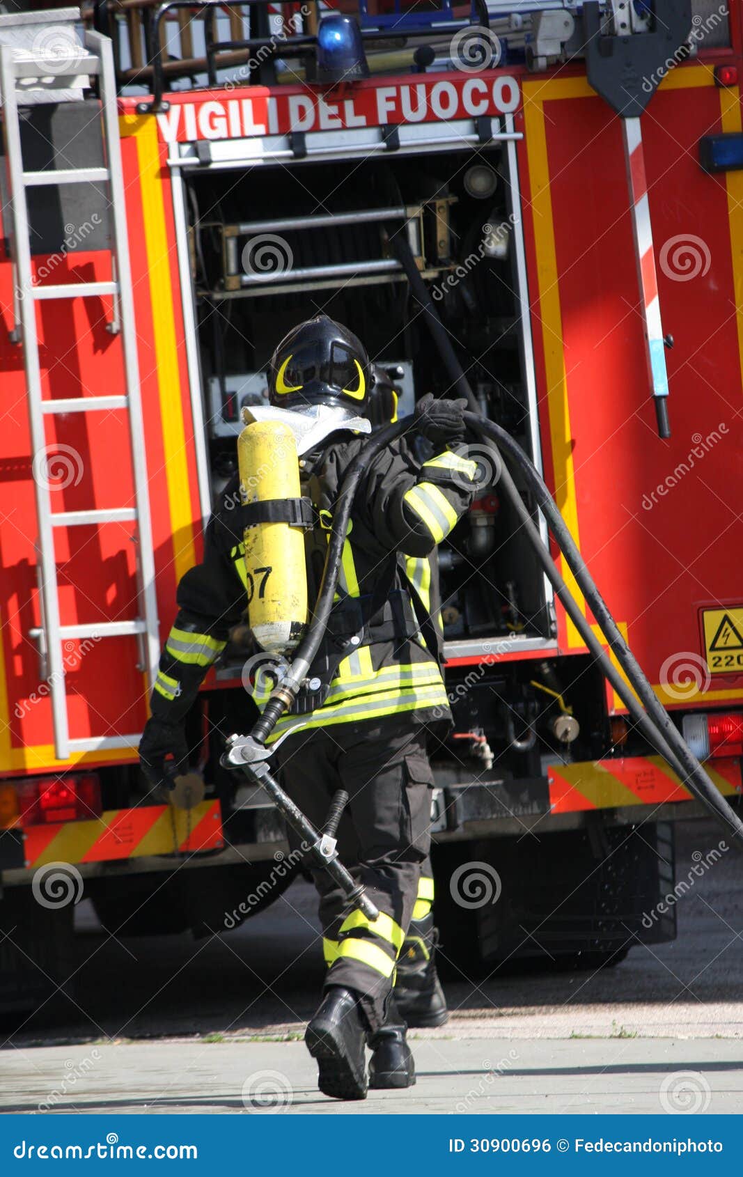Brave Firefighters with Oxygen Tank Fire during an Exercise Held ...