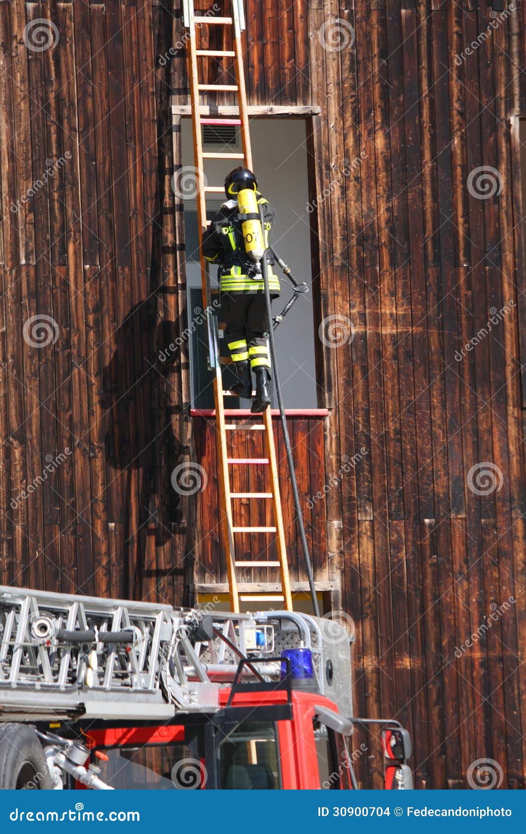 Brave Firefighters with Oxygen Tank Fire during an Exercise Held Stock ...