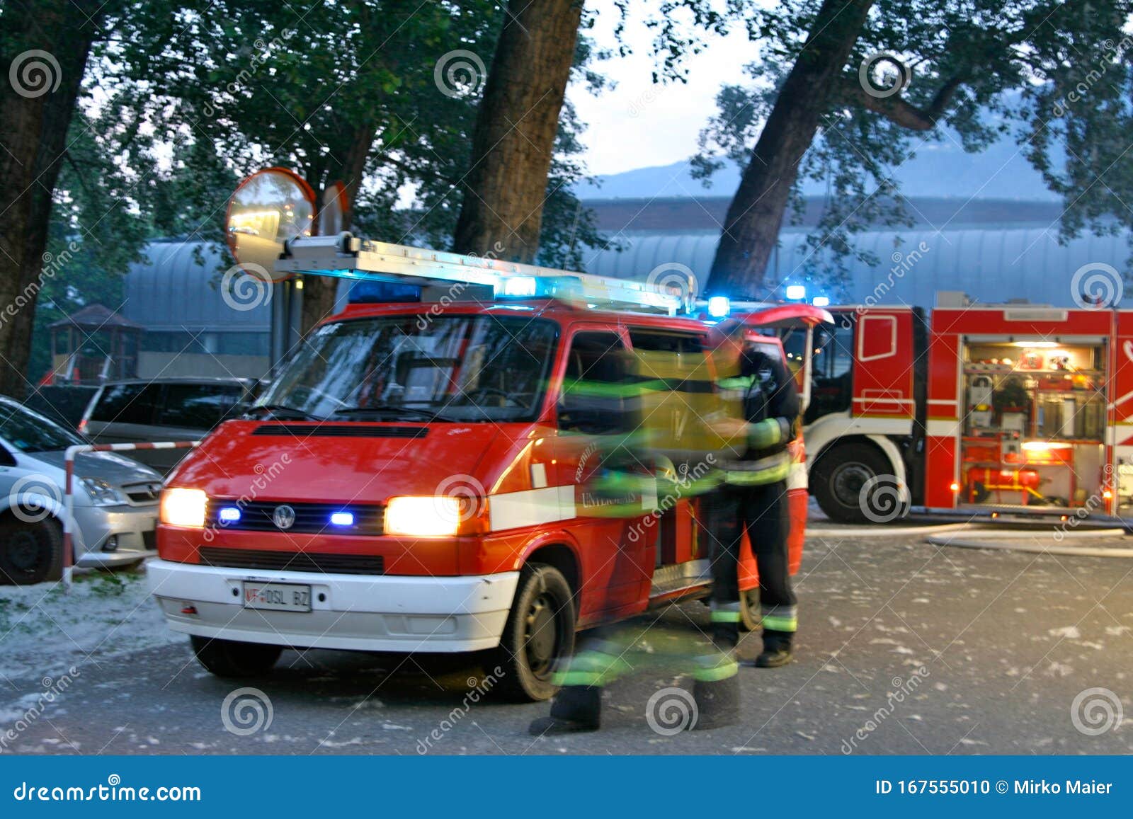 Brave Firefighters with the Truck and Fire Hydrants in Operation ...