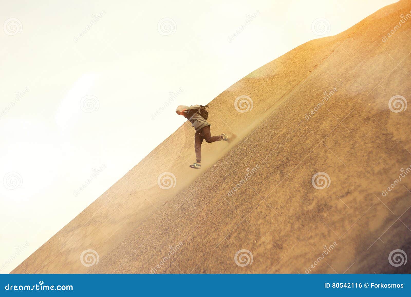 Brave Man with Backpack Running on a Dune Stock Photo - Image of gold ...