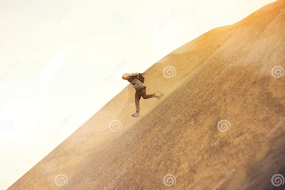 Brave Man with Backpack Running on a Dune Stock Photo - Image of gold ...