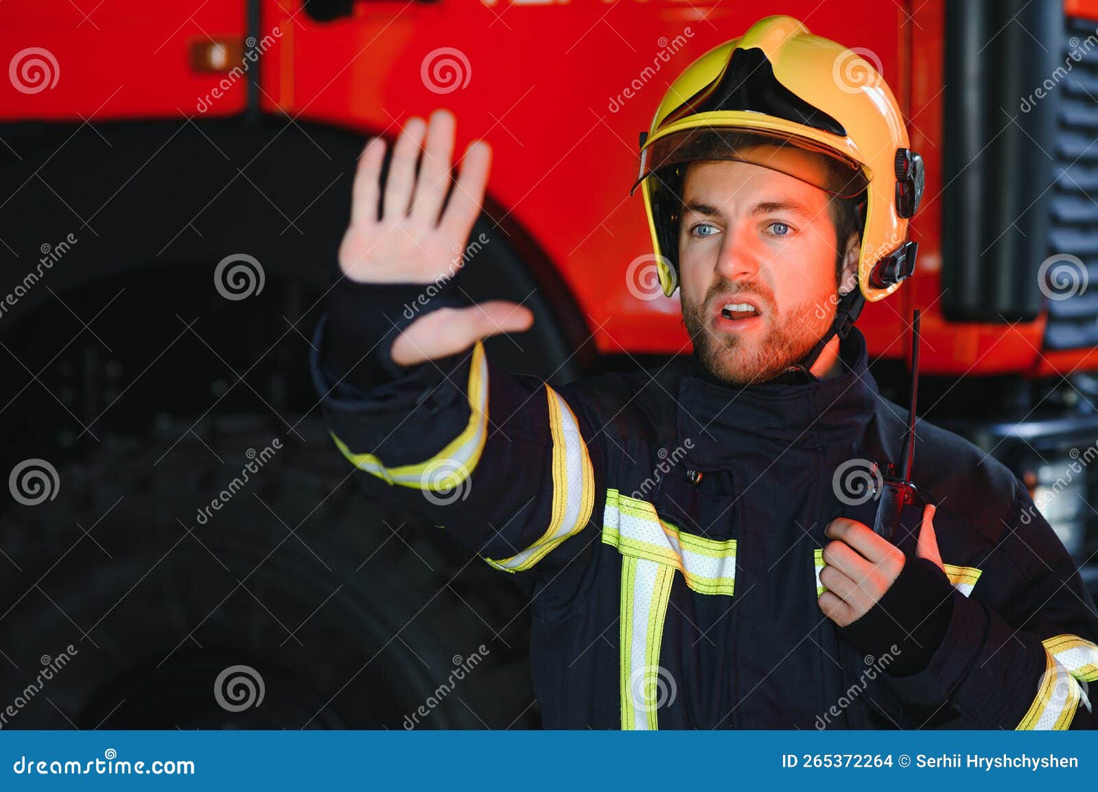 Brave Young Fireman Wearing Protective Uniform. Stock Photo - Image of ...