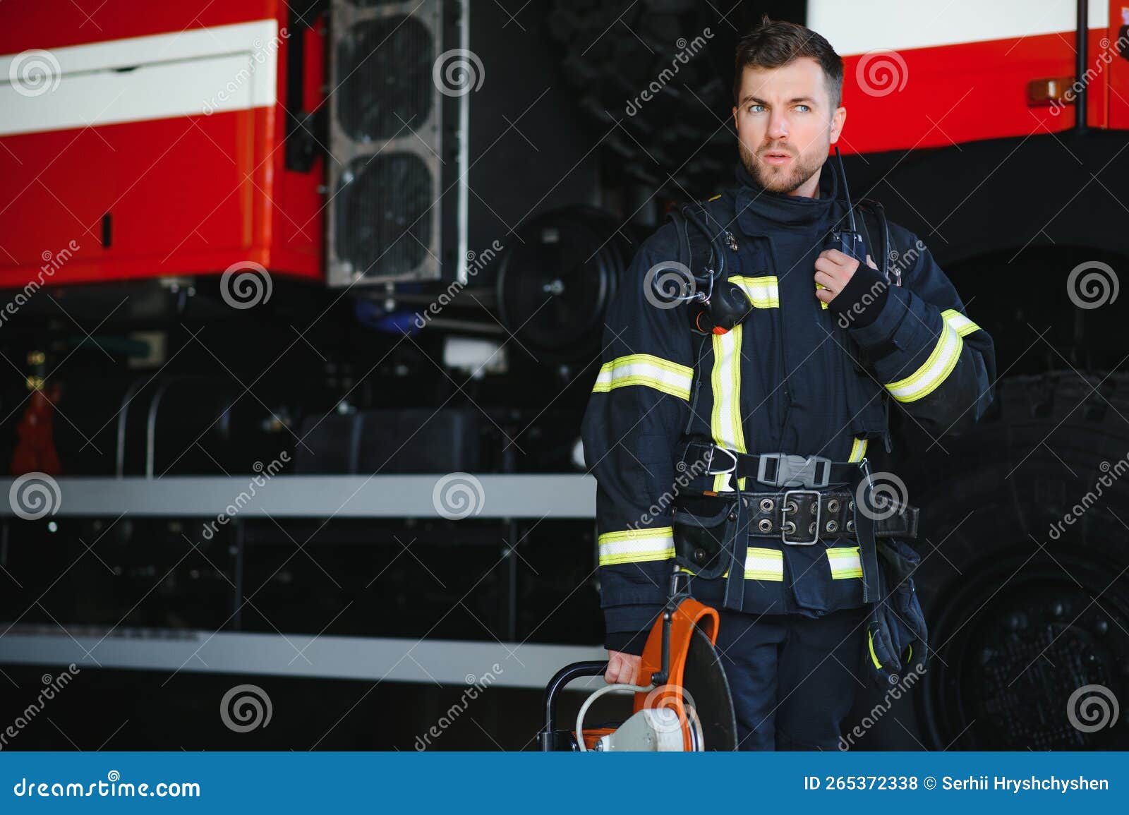 Brave Young Fireman Wearing Protective Uniform. Stock Photo - Image of ...