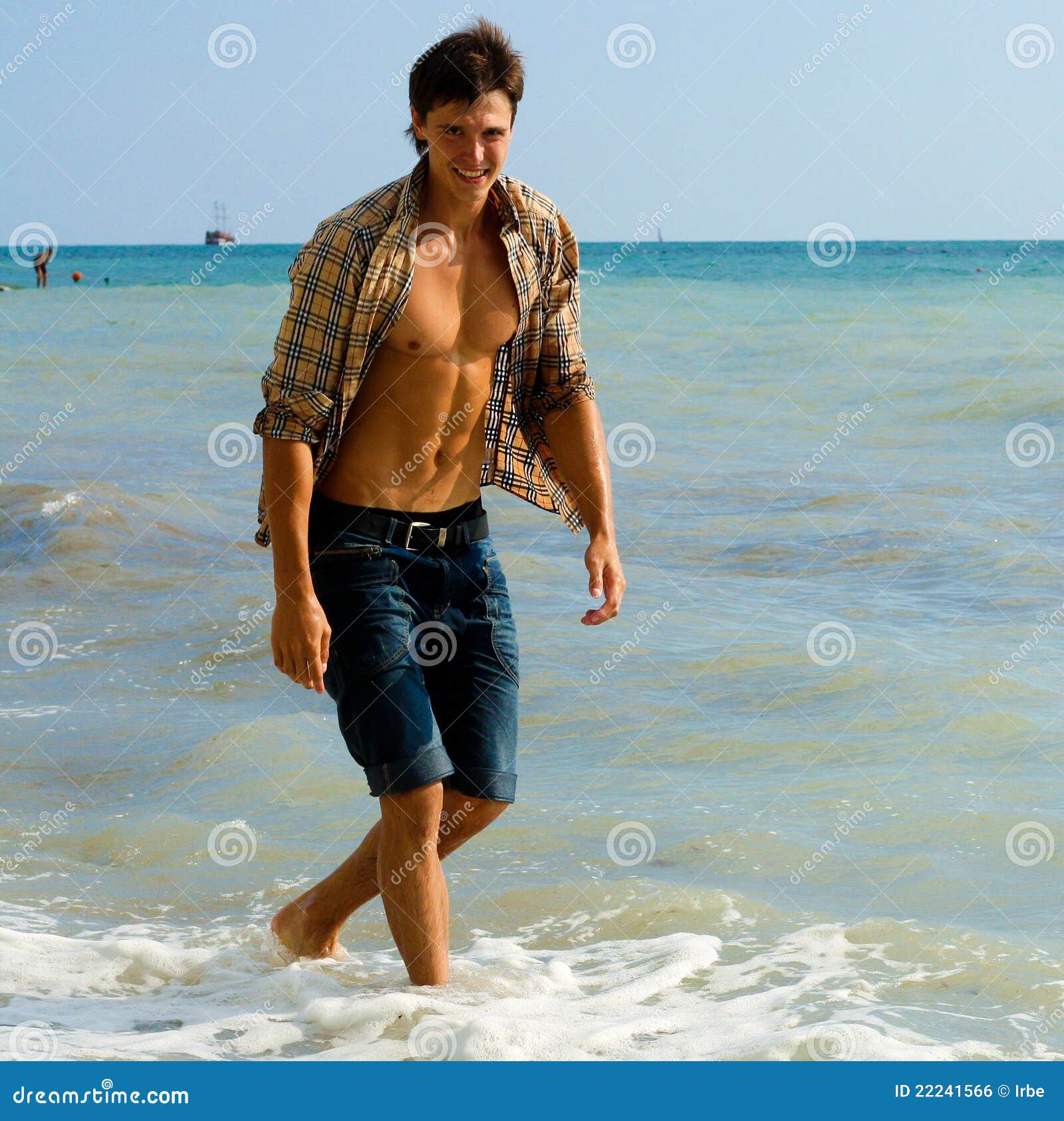 Brawny lad stock photo. Image of relaxation, beach, young - 22241566