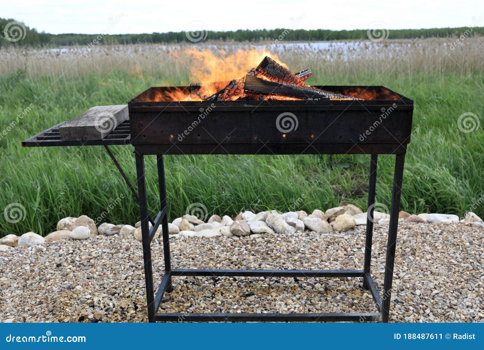 Brazier with burning wood stock image. Image of natural - 188487611