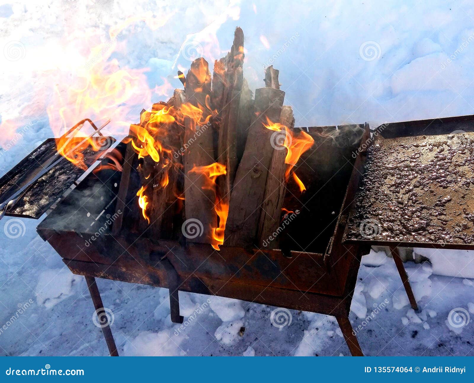 Brazier with burning wood stock photo. Image of grate - 135574064